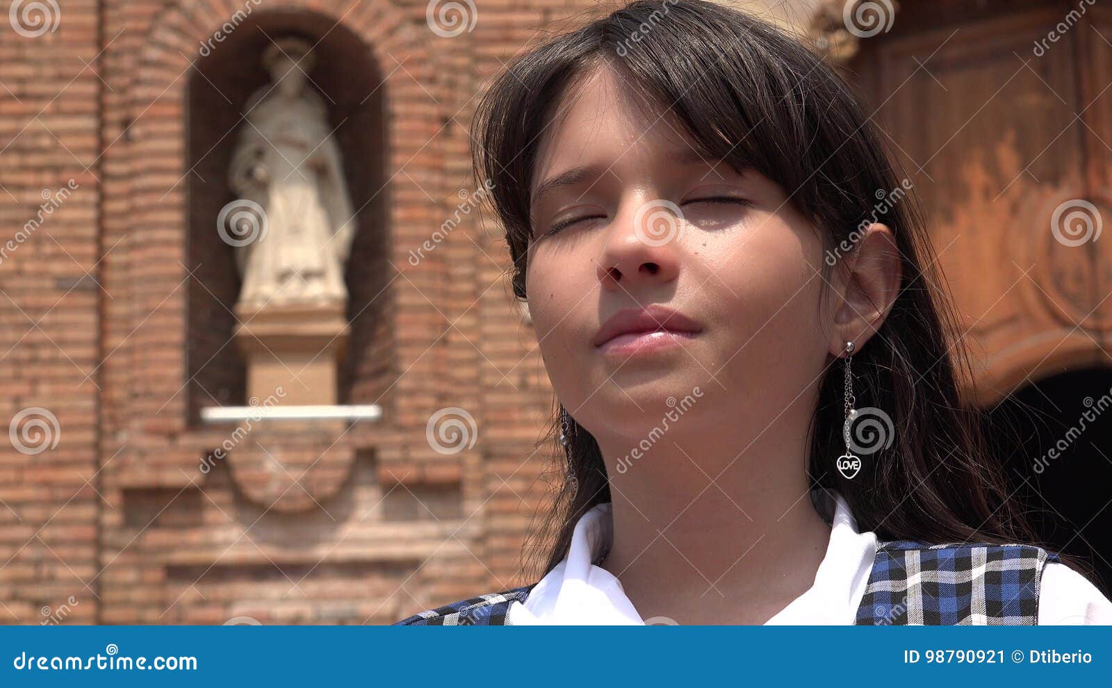 A Girl Praying stock image. Image of religious, hispanic - 98790921