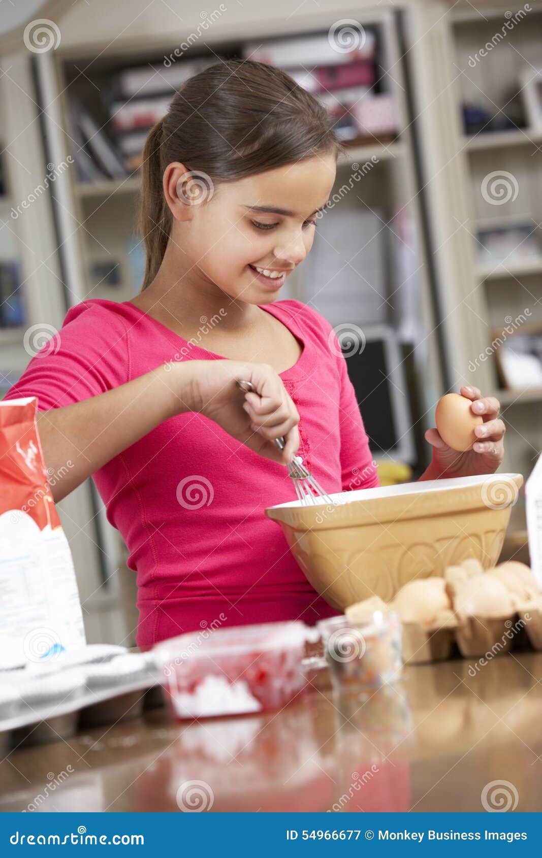 Girl Preparing Ingredients To Bake Cakes in Kitchen Stock Image - Image ...