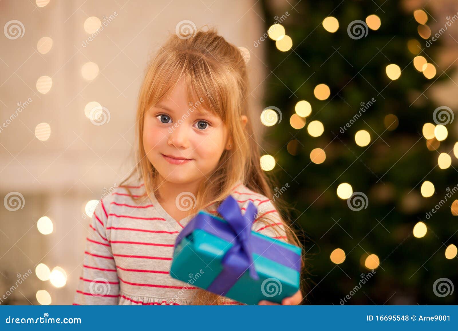 Girl with Present at Christmas Stock Photo - Image of person, present ...