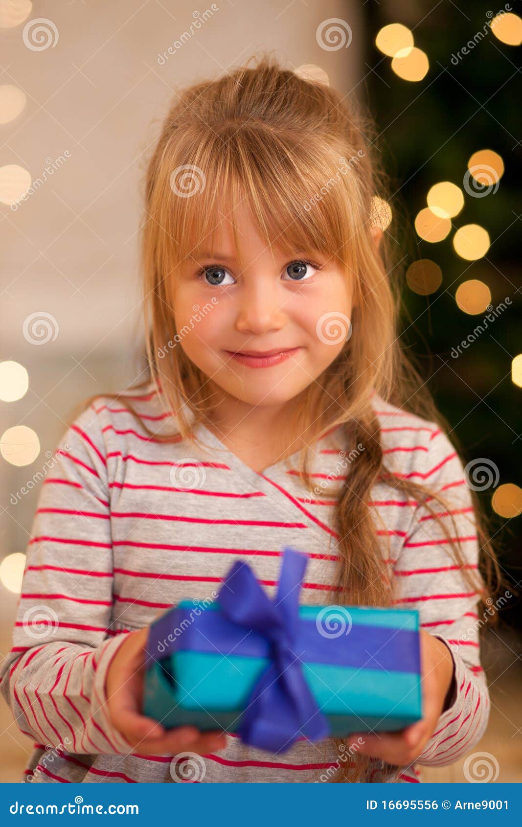 Girl with Present at Christmas Stock Photo - Image of gift, girl: 16695556