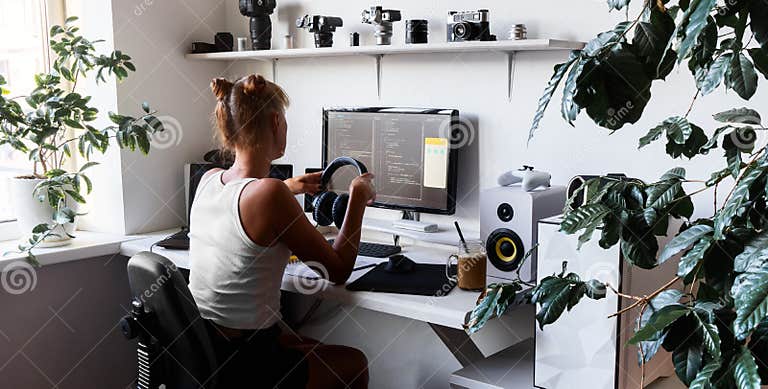 Girl Programmer in the Modern Developer Workplace for Writing Code with ...