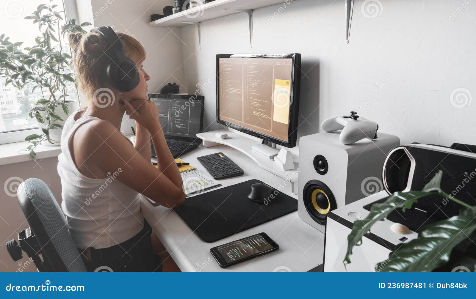 Girl Programmer in the Modern Developer Workplace for Writing Code with ...