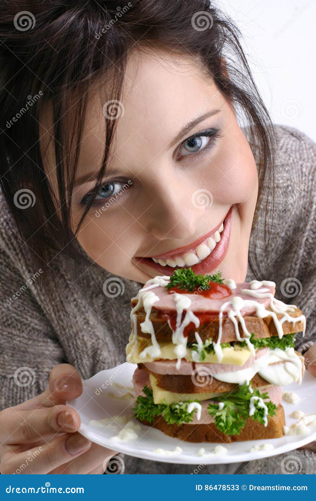 A girl proposes a sandwich stock image. Image of bread - 86478533
