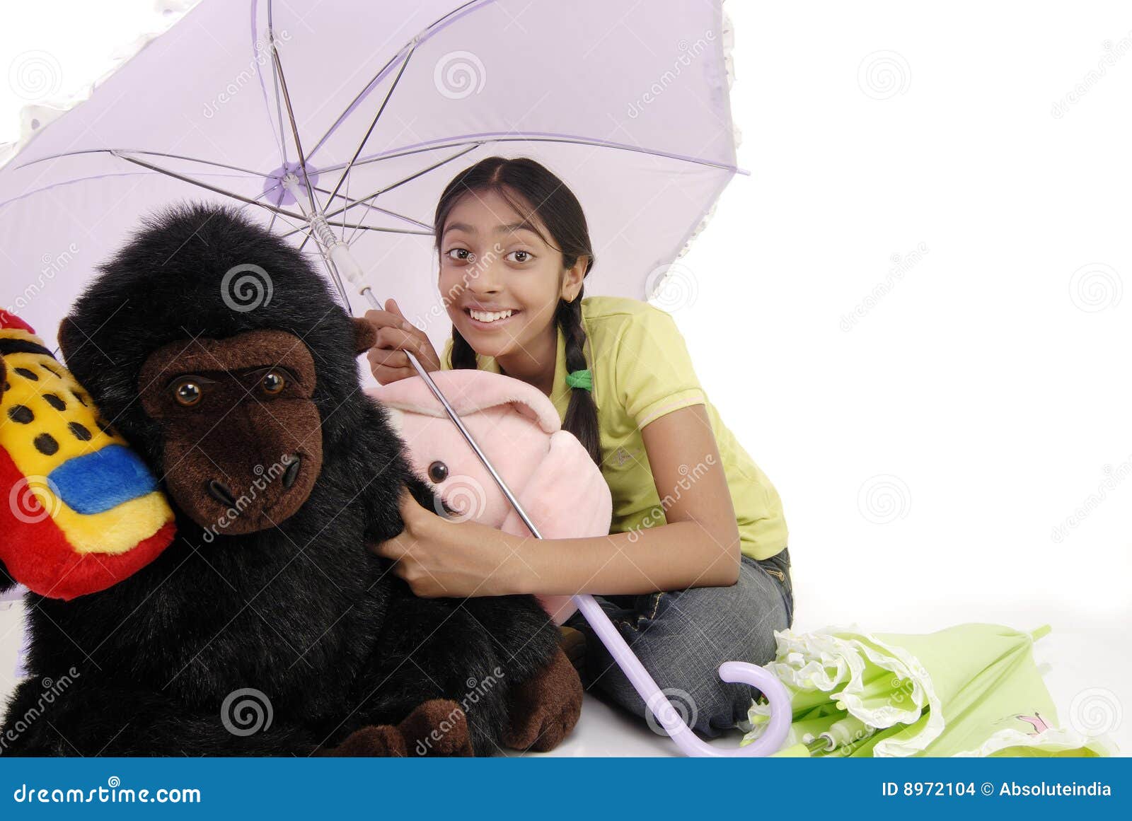 Girl Protecting Toy in Umbrella Stock Photo - Image of green, portrait ...