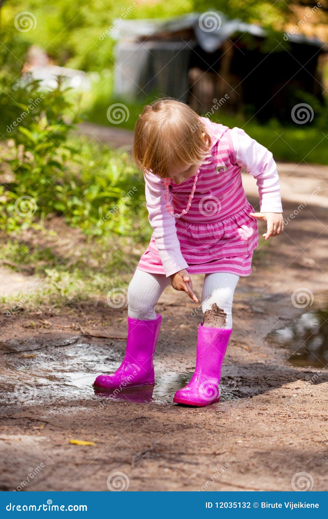 Girl in a puddle stock photo. Image of happy, child, mark - 12035132