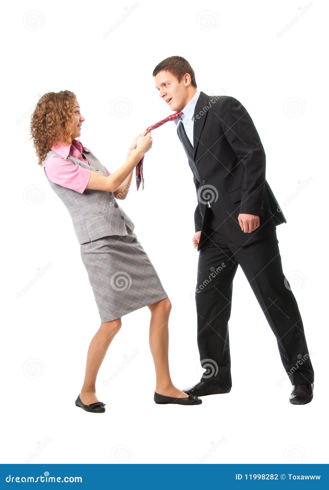 Girl pulls a man in a tie stock photo. Image of holding - 11998282