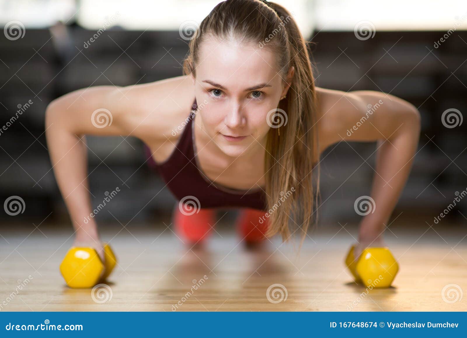 Girl Push Ups Using Dumbbell Stock Photo - Image of lifting, athletic ...