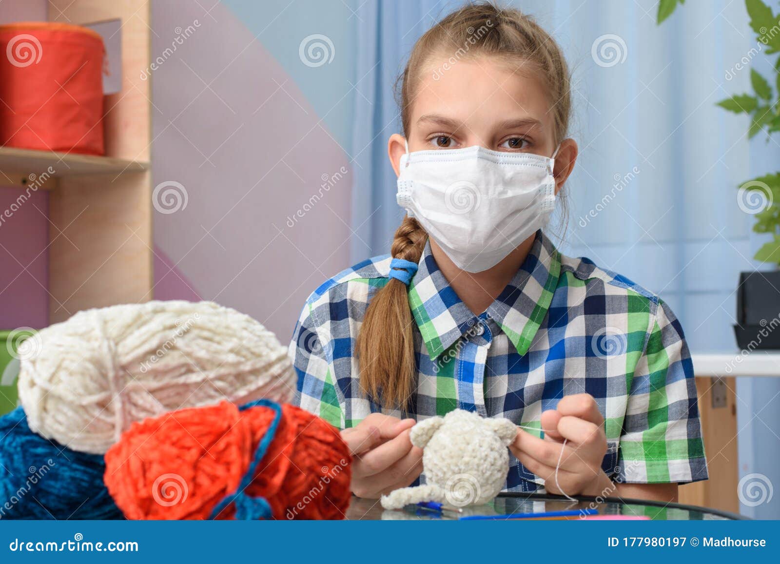 A Girl in Quarantine Self-isolation is Engaged in Knitting Stock Image ...