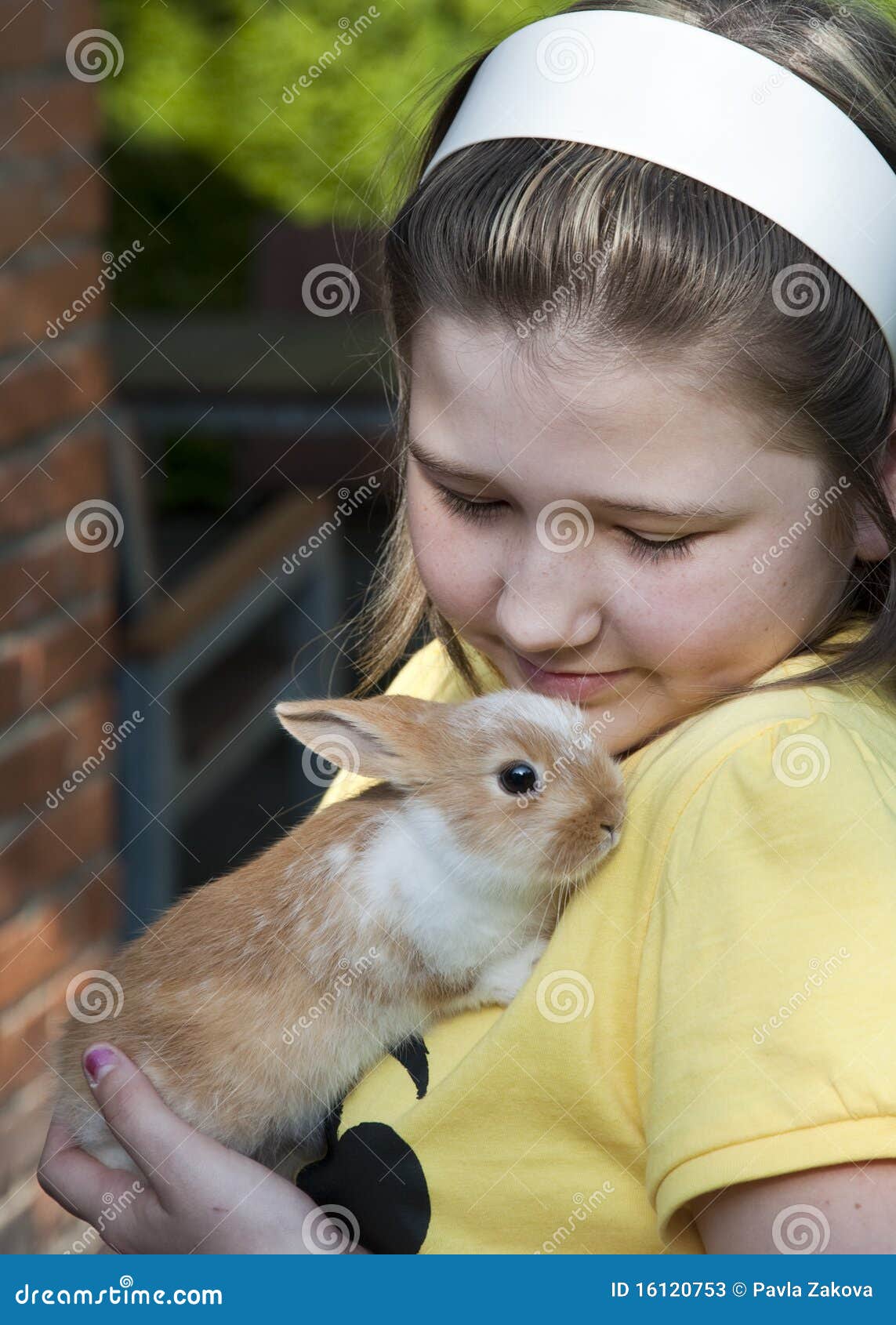 Girl with rabbit stock image. Image of friend, blond - 16120753