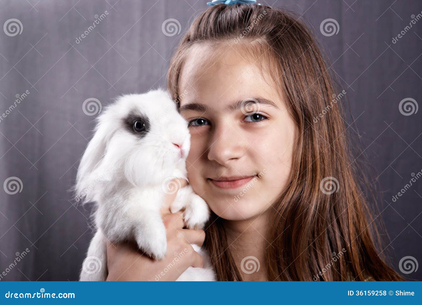 Girl with a rabbit stock photo. Image of kids, touch - 36159258