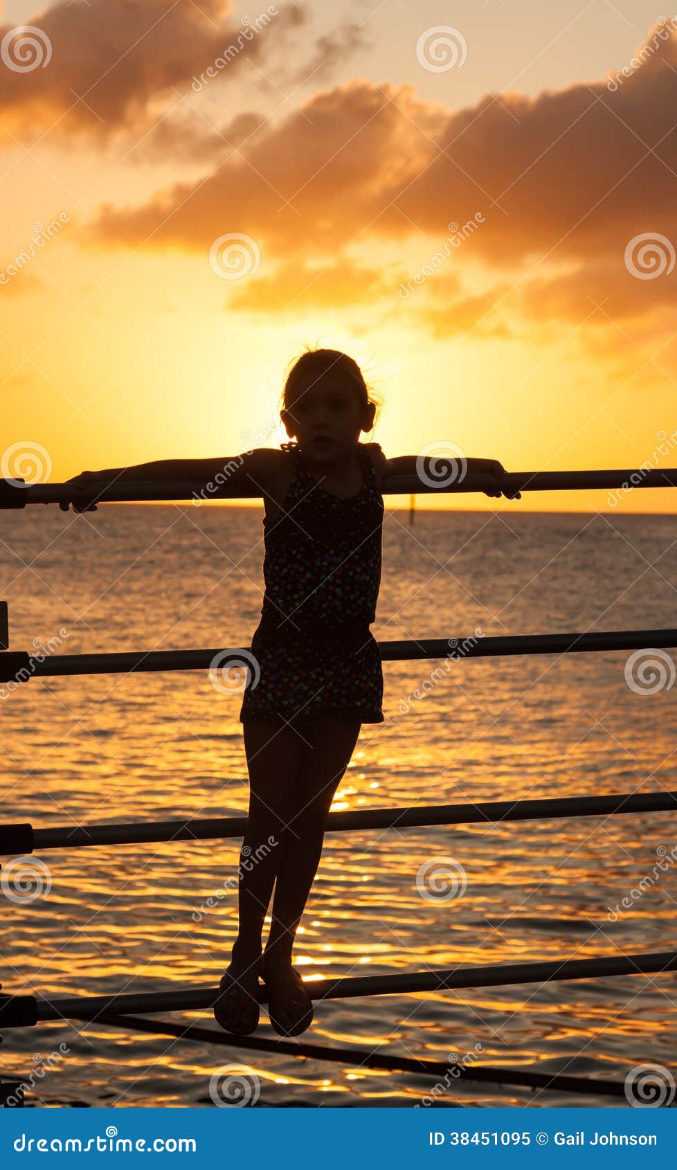 Girl on railings stock image. Image of emma, punda, lights - 38451095