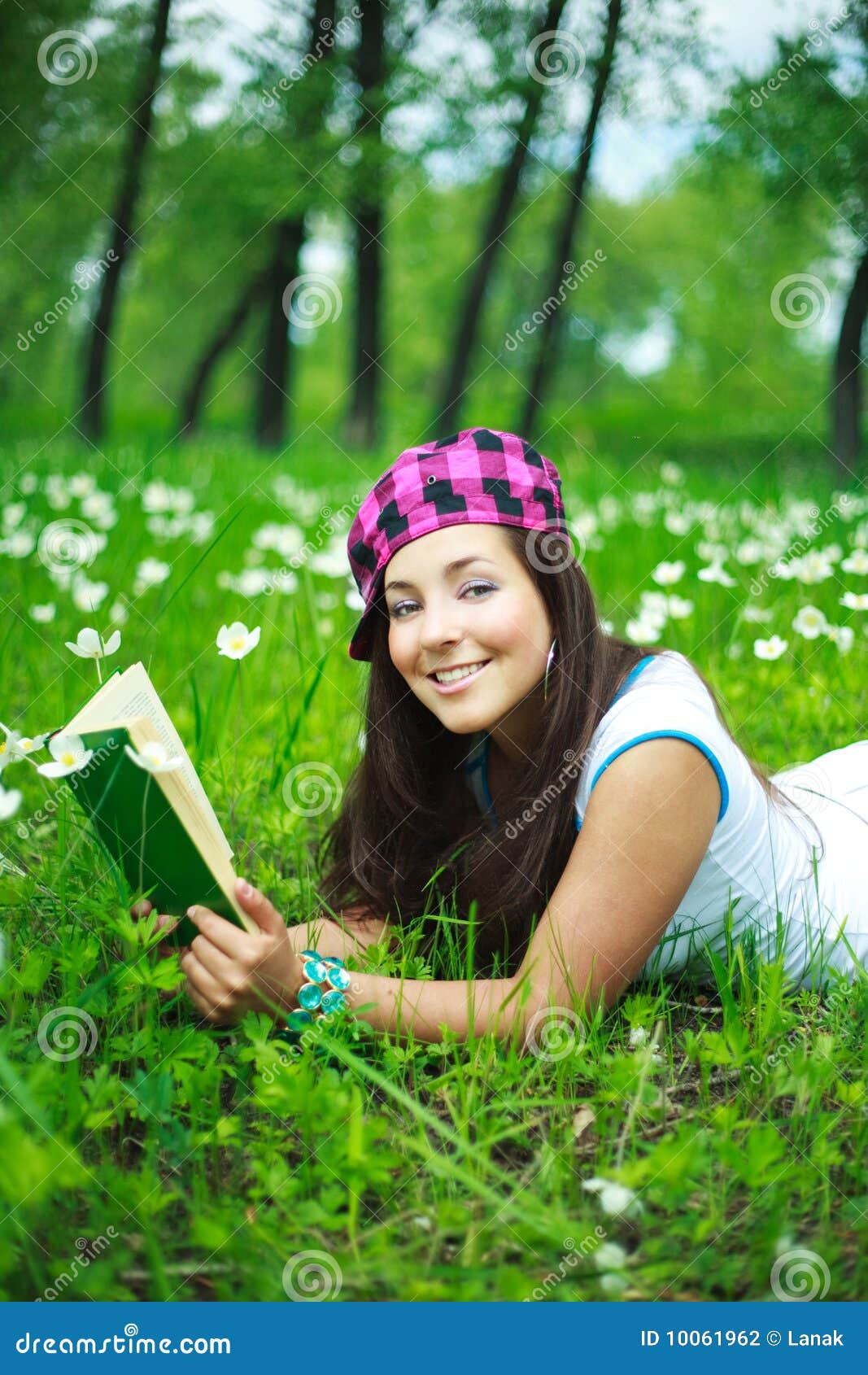 Girl reading a book stock photo. Image of flowers, casual - 10061962