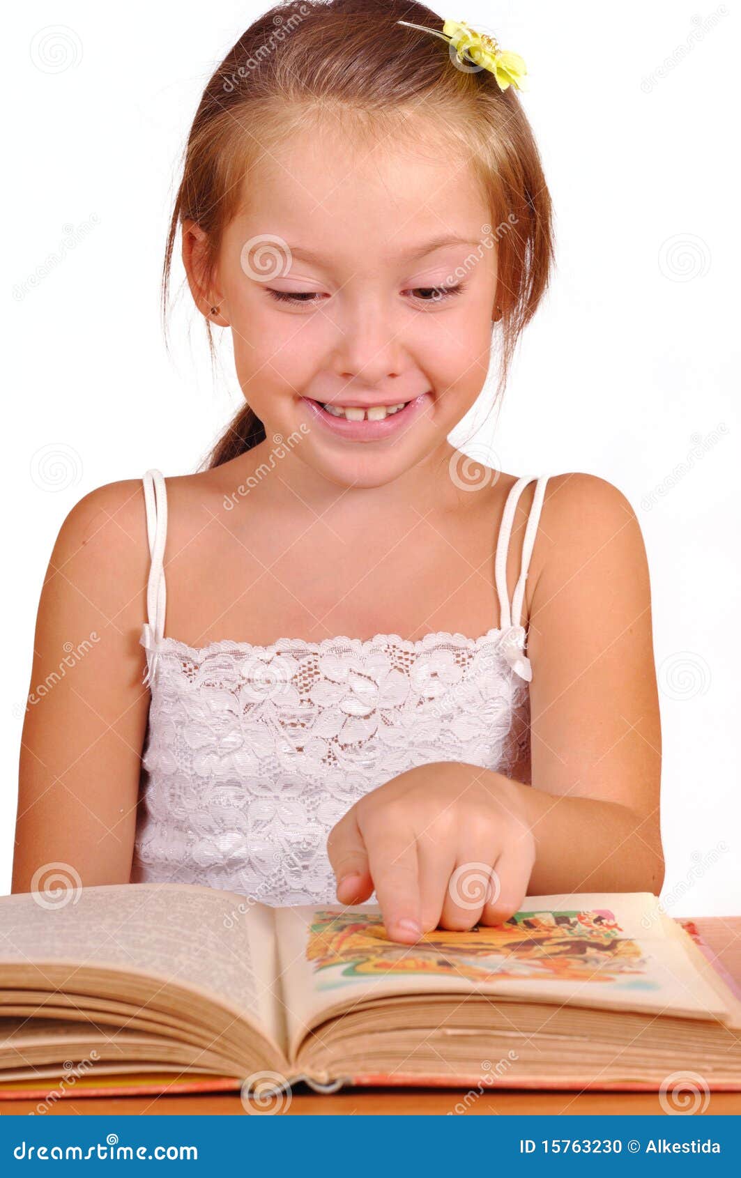 Girl reading a book stock photo. Image of innocence, book - 15763230
