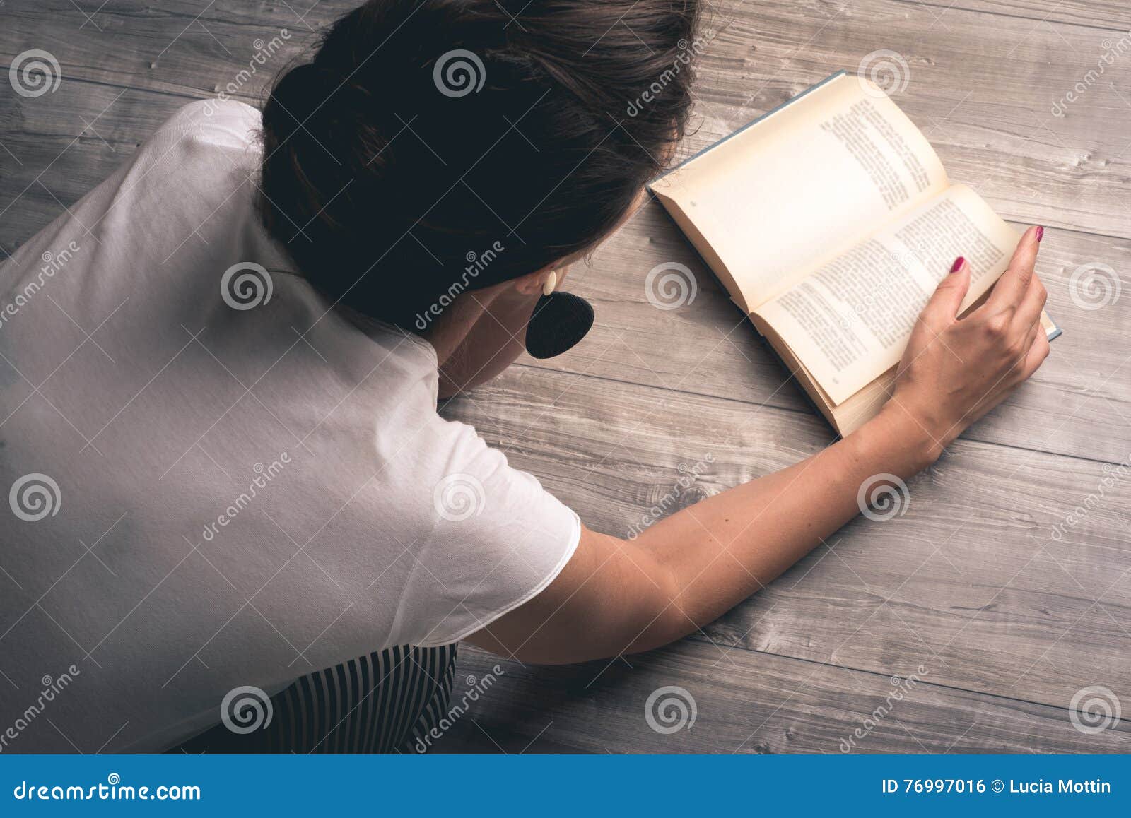 Girl Reading a Book on the Floor Stock Photo - Image of learning ...