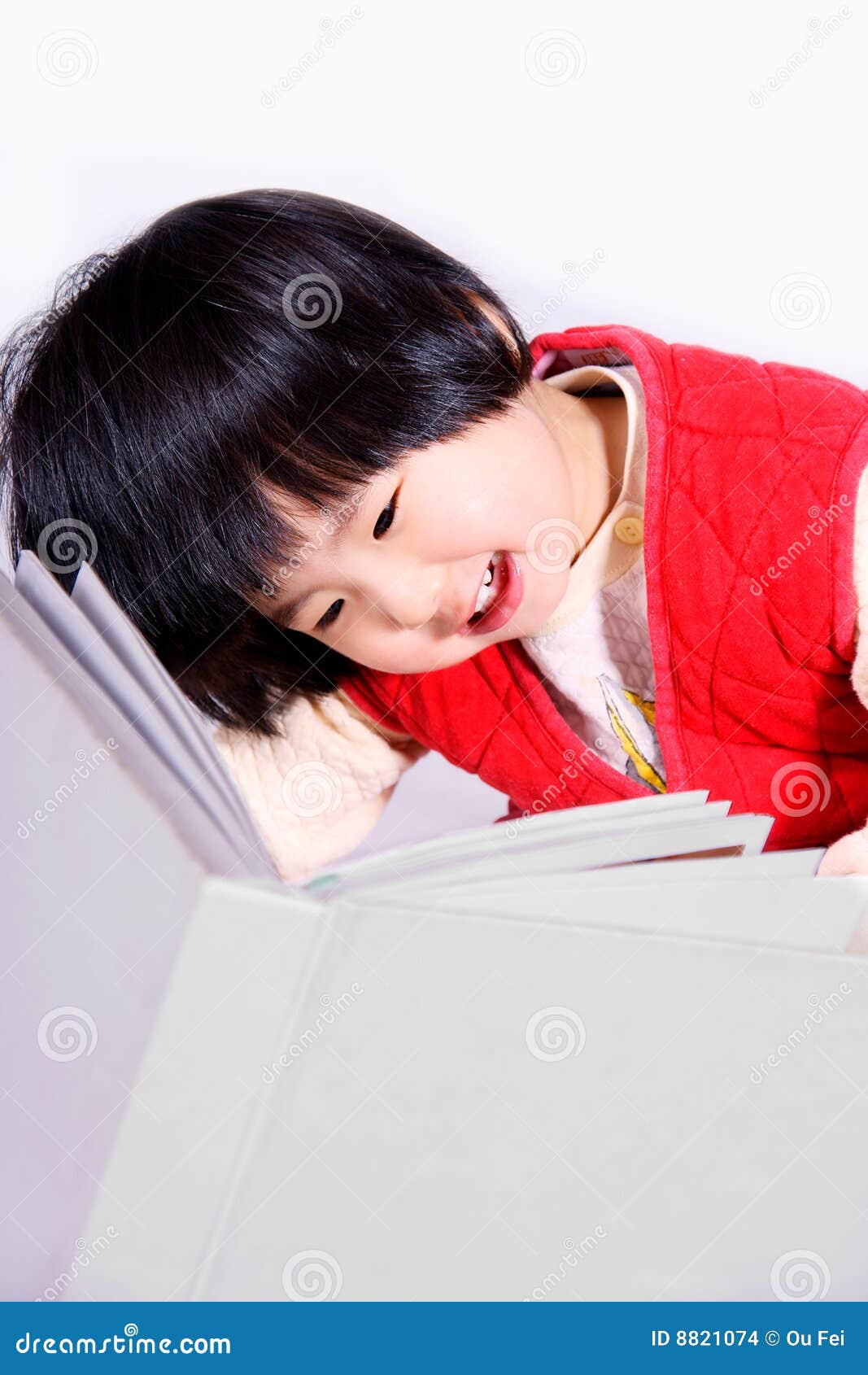 Girl Reading Book and Laughing Stock Photo - Image of smiling, child ...