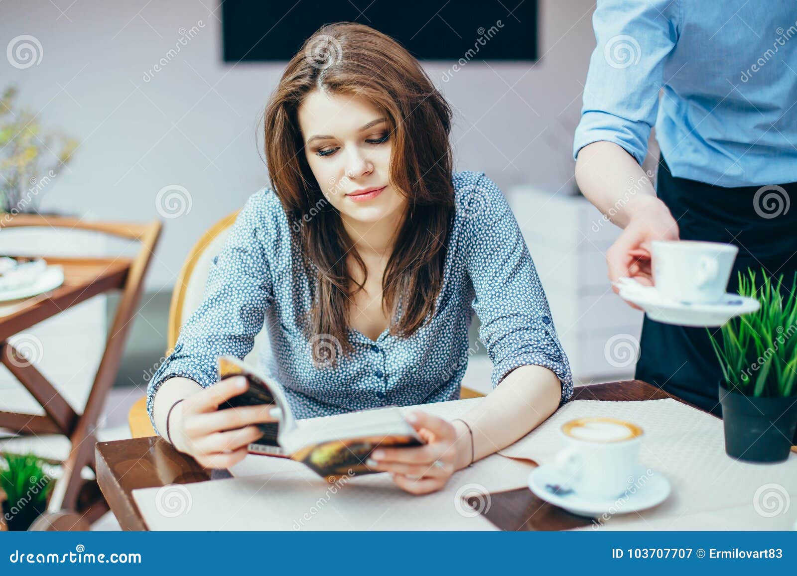A Girl is Reading a Book Sitting in a Cafe Stock Image - Image of ...