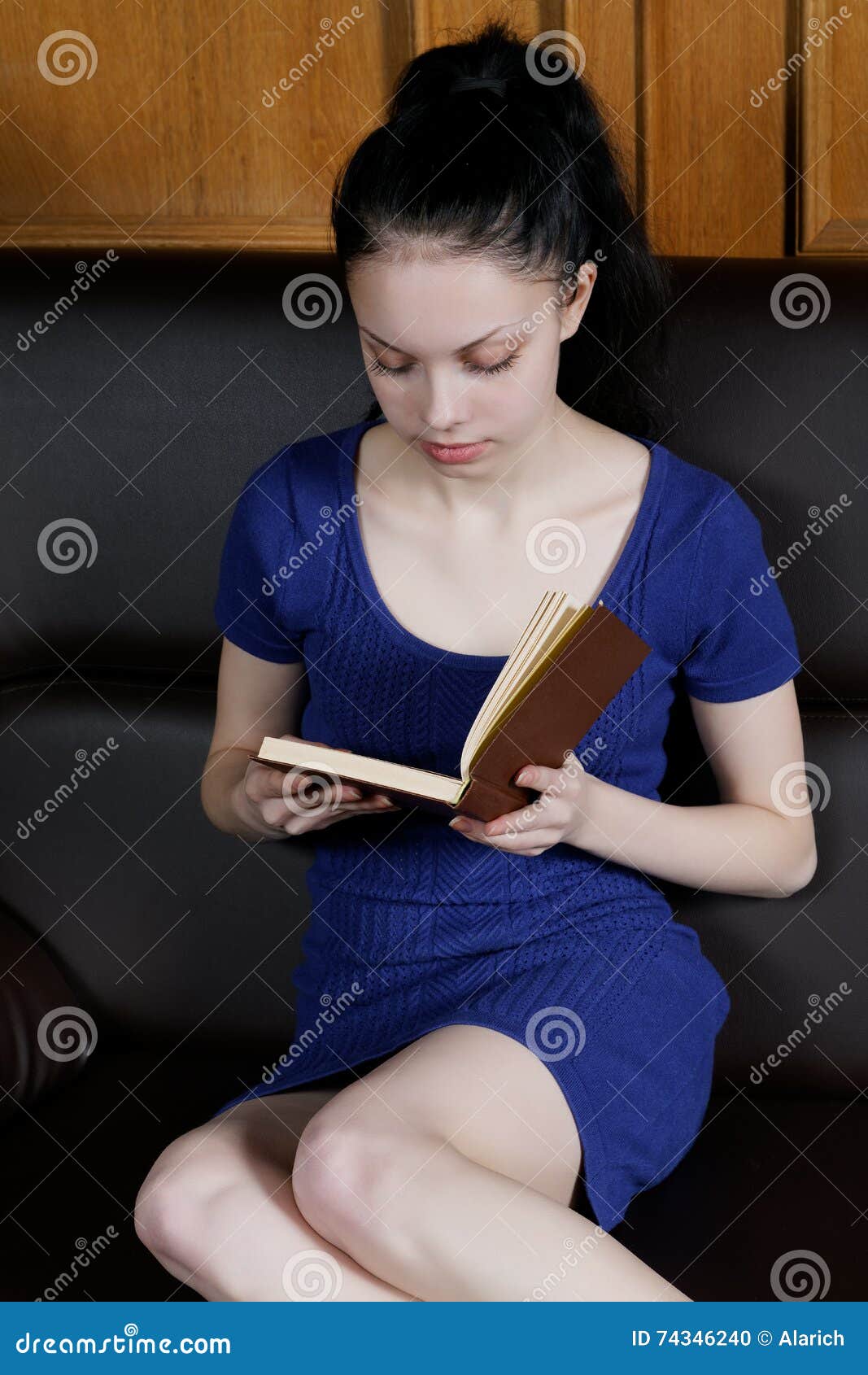 Girl Reading a Book Sitting Stock Photo - Image of novel, lady: 74346240