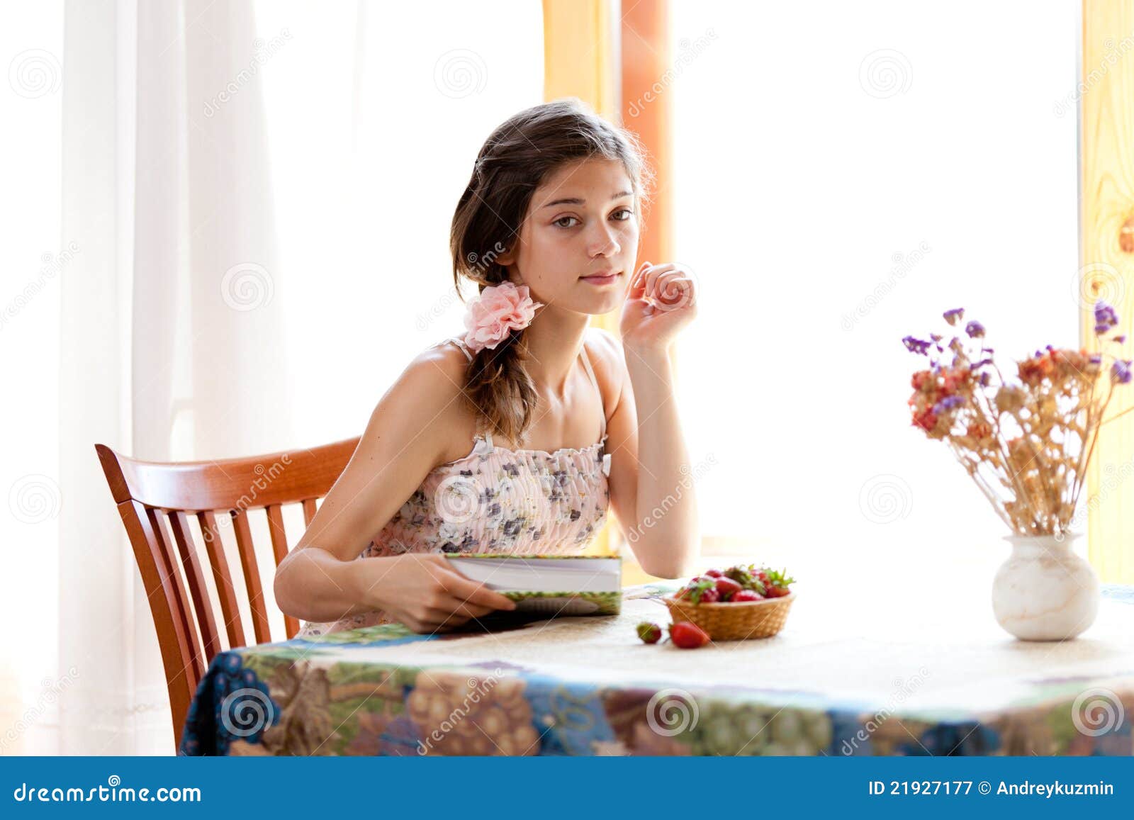 Girl Reading Book Sitting at Table with Strawberry Stock Image - Image ...