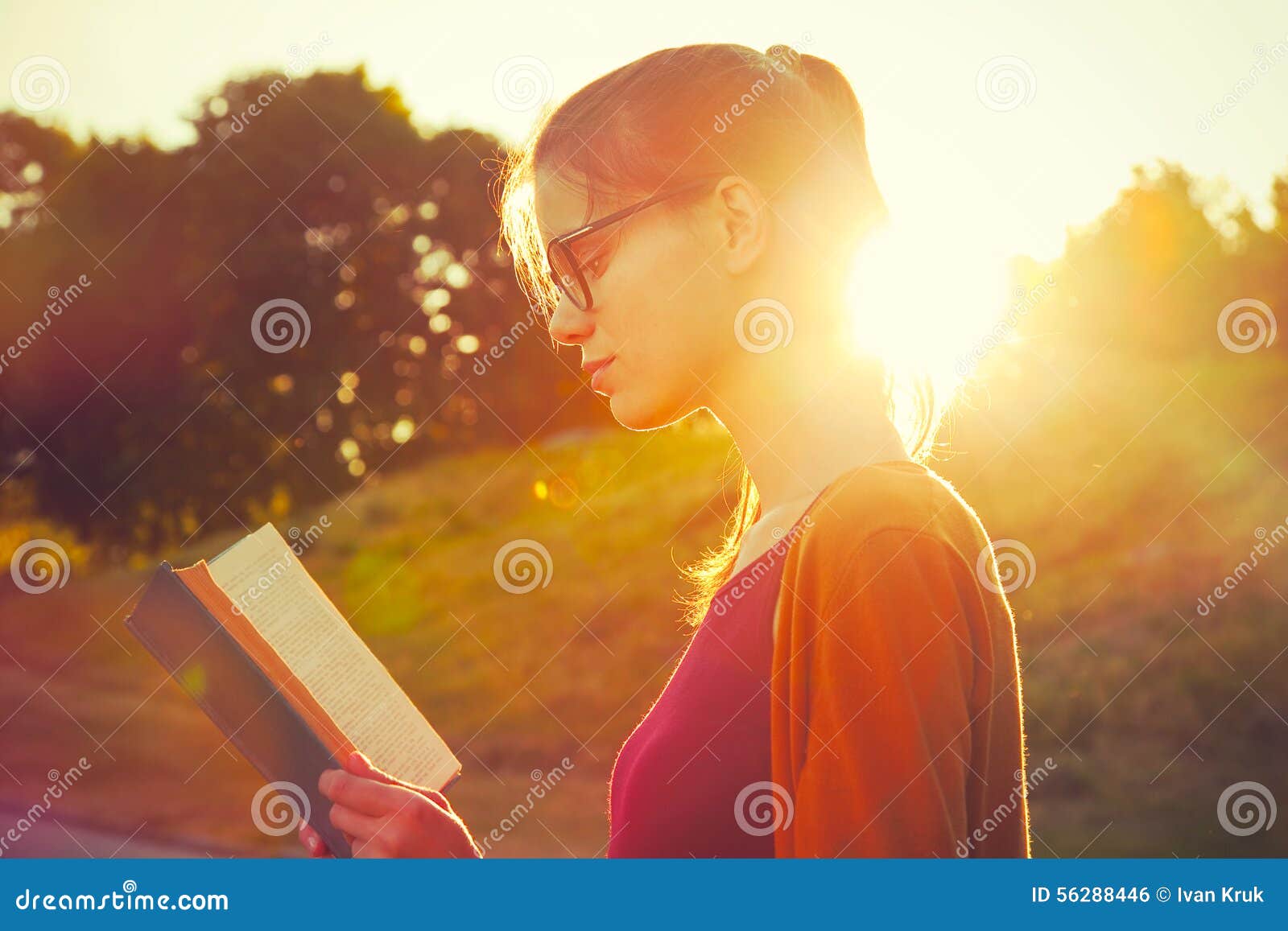 Girl reading book stock photo. Image of enjoyment, natural - 56288446