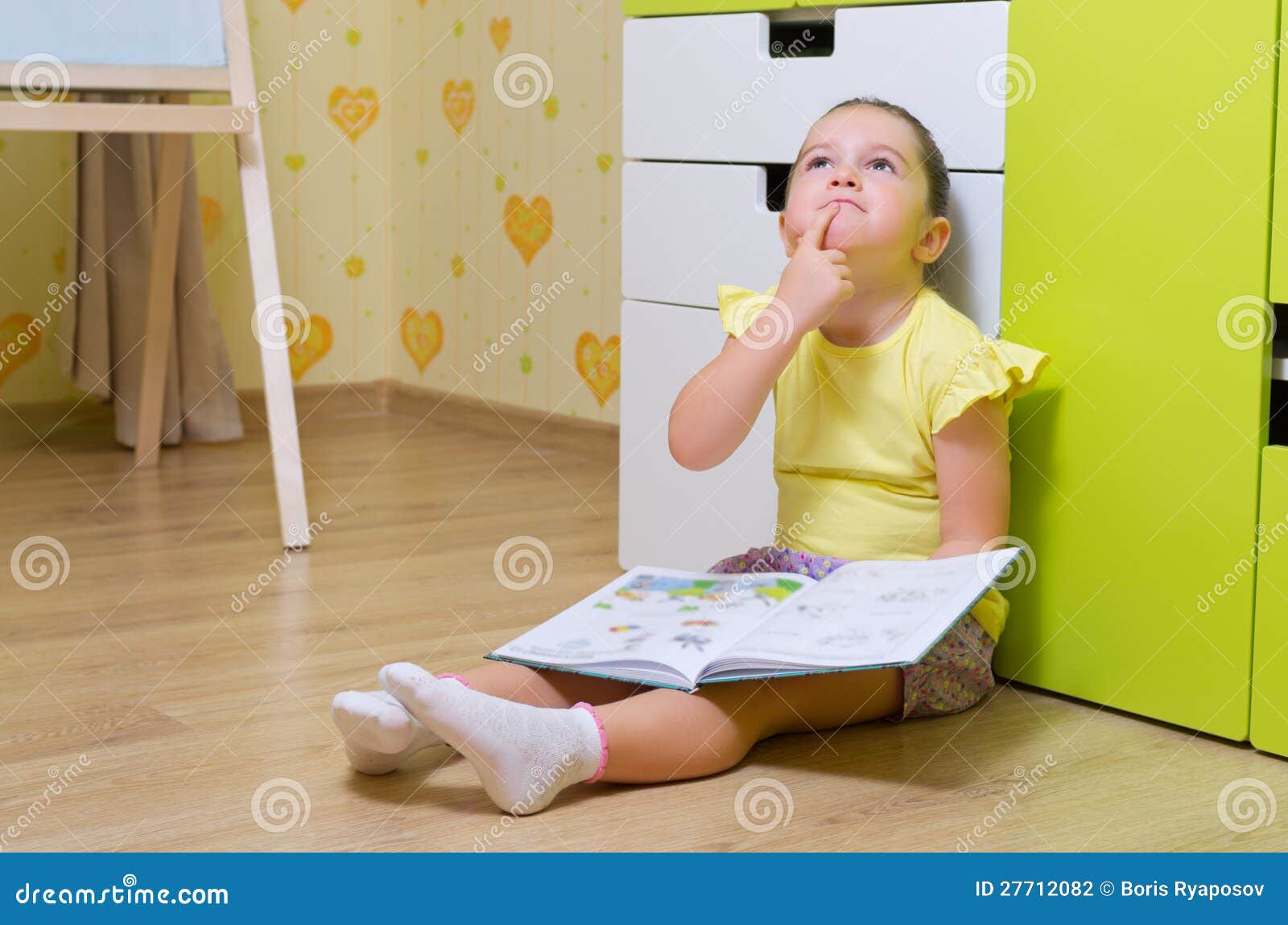 Girl reading box in a home stock photo. Image of learning - 27712082