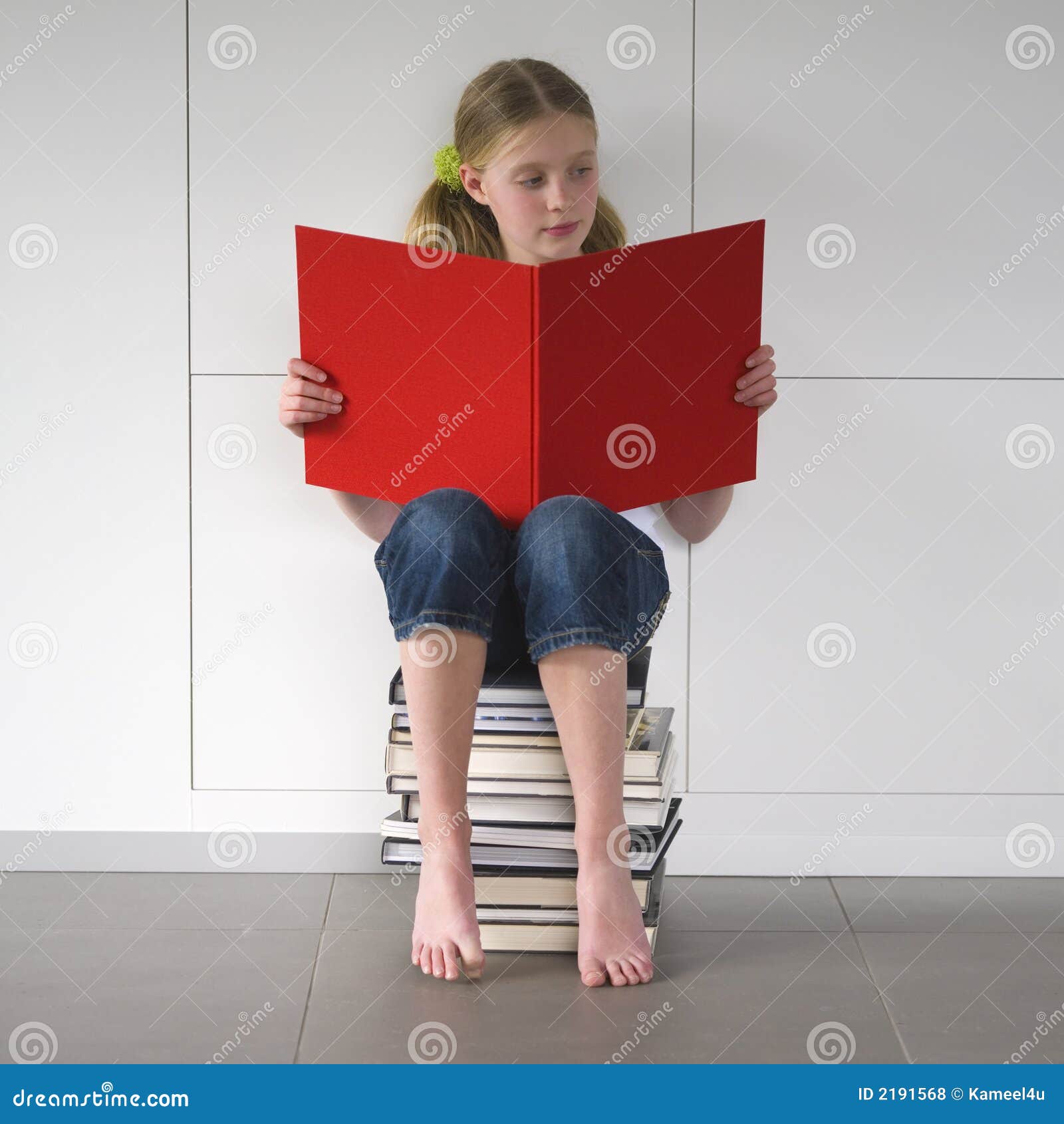 Girl Reading an Exciting Book Stock Photo - Image of intelligent, stack ...