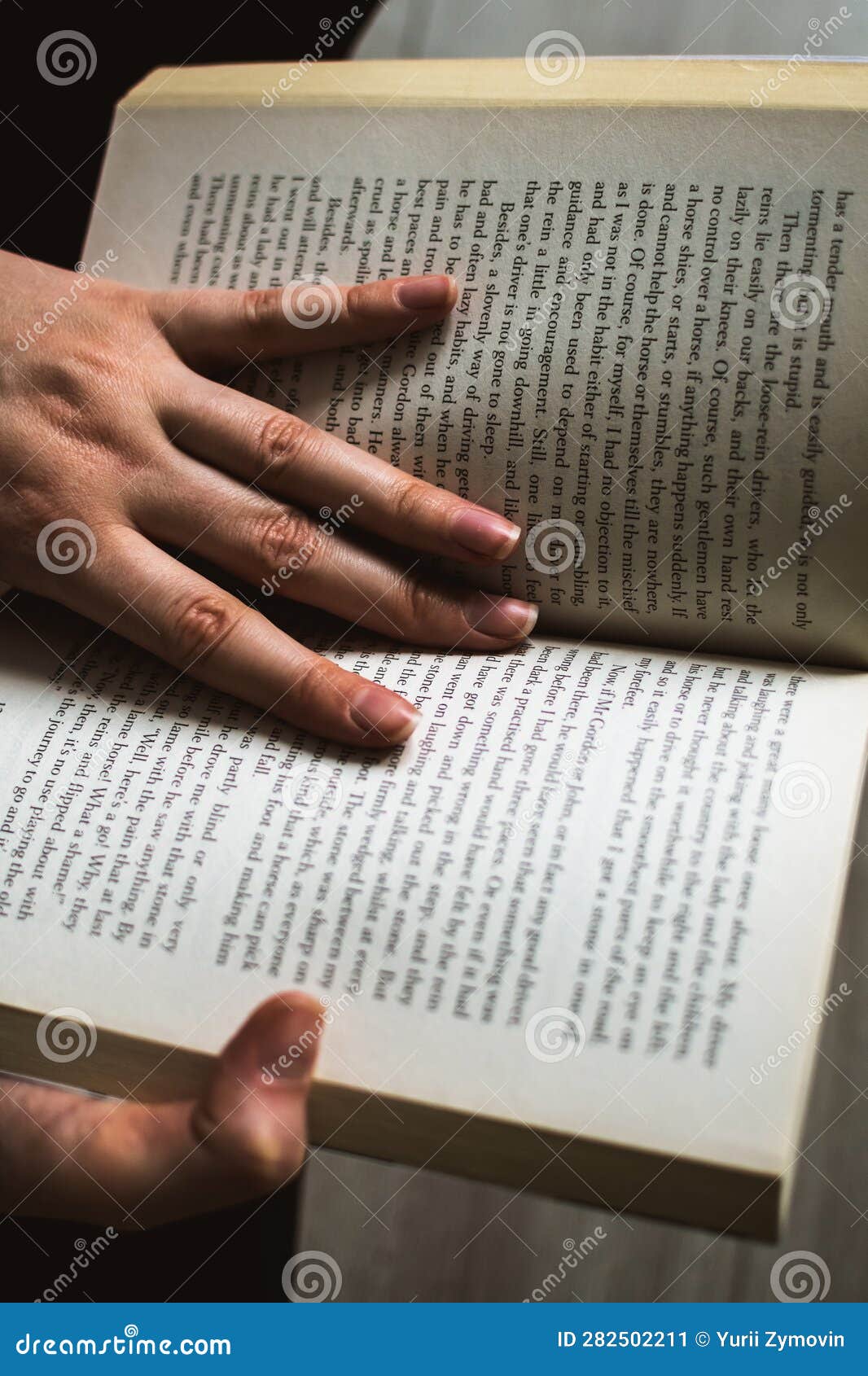 A Girl Reading a Famous Classic Novel Stock Image - Image of hands ...