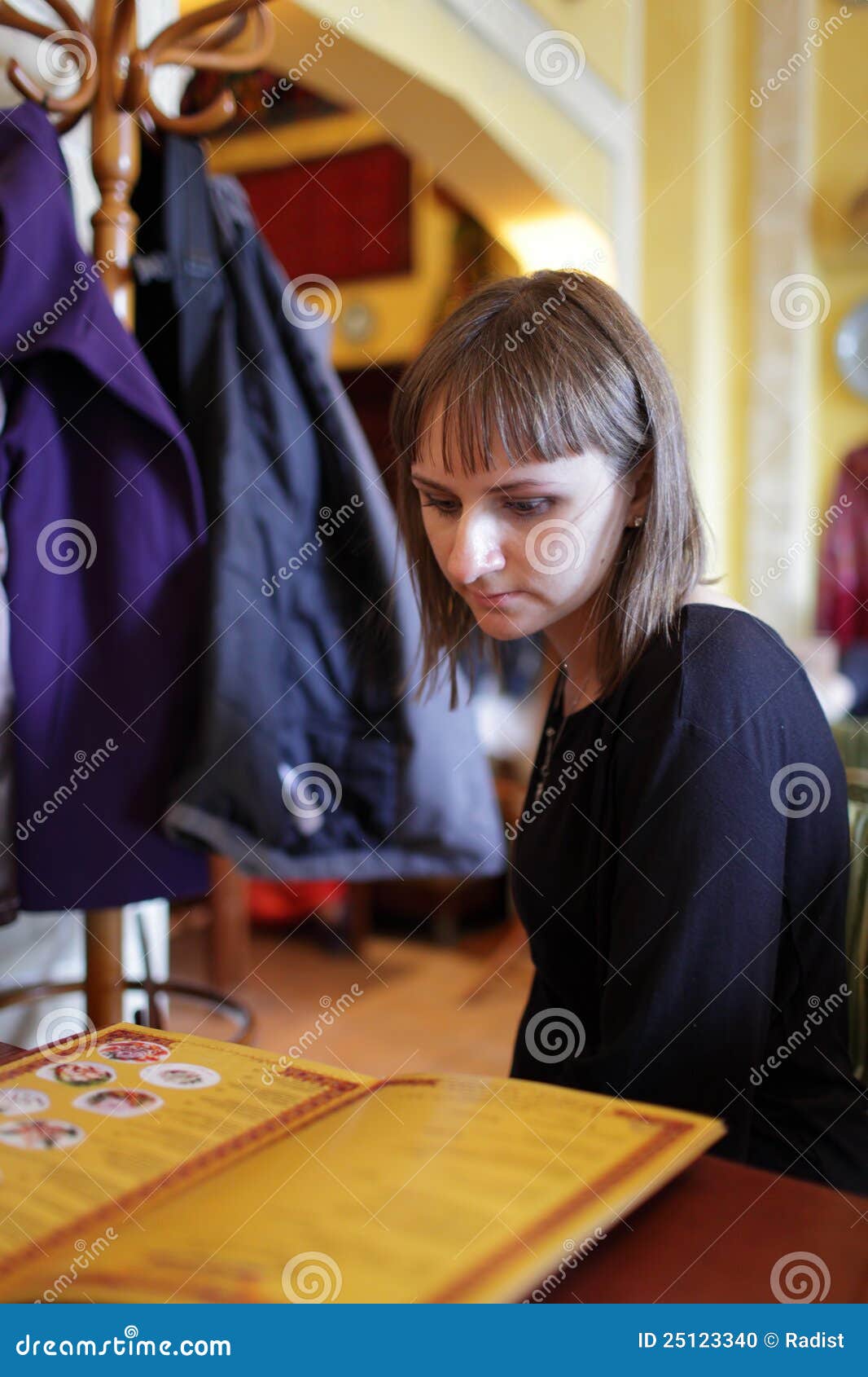 Girl reading menu stock photo. Image of decisions, food - 25123340