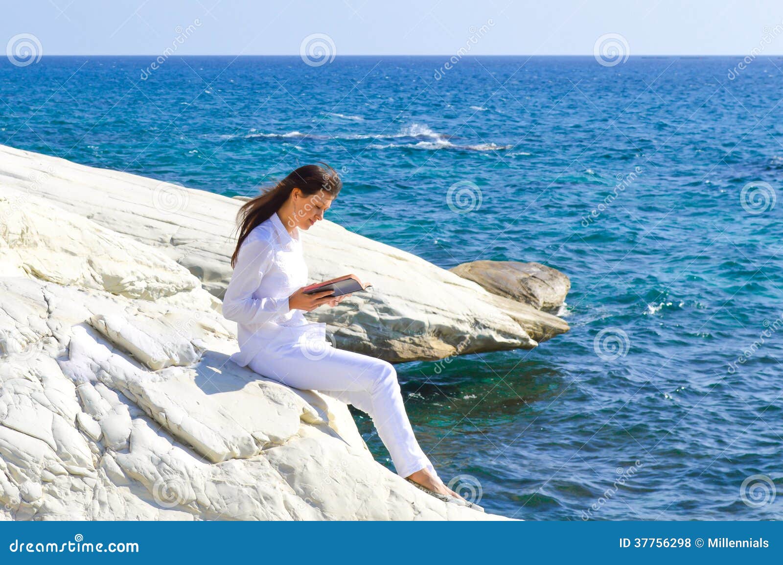 Girl reading by the sea stock photo. Image of mediterranean - 37756298