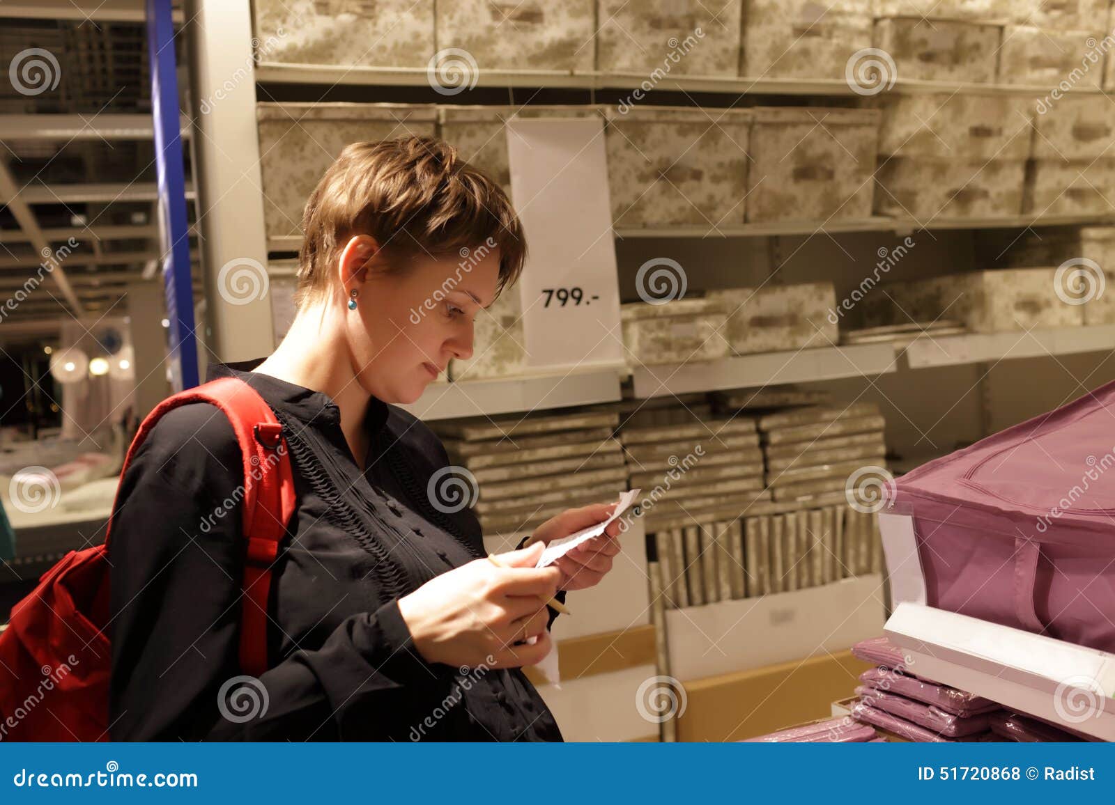 Girl reading shopping list stock photo. Image of adult - 51720868
