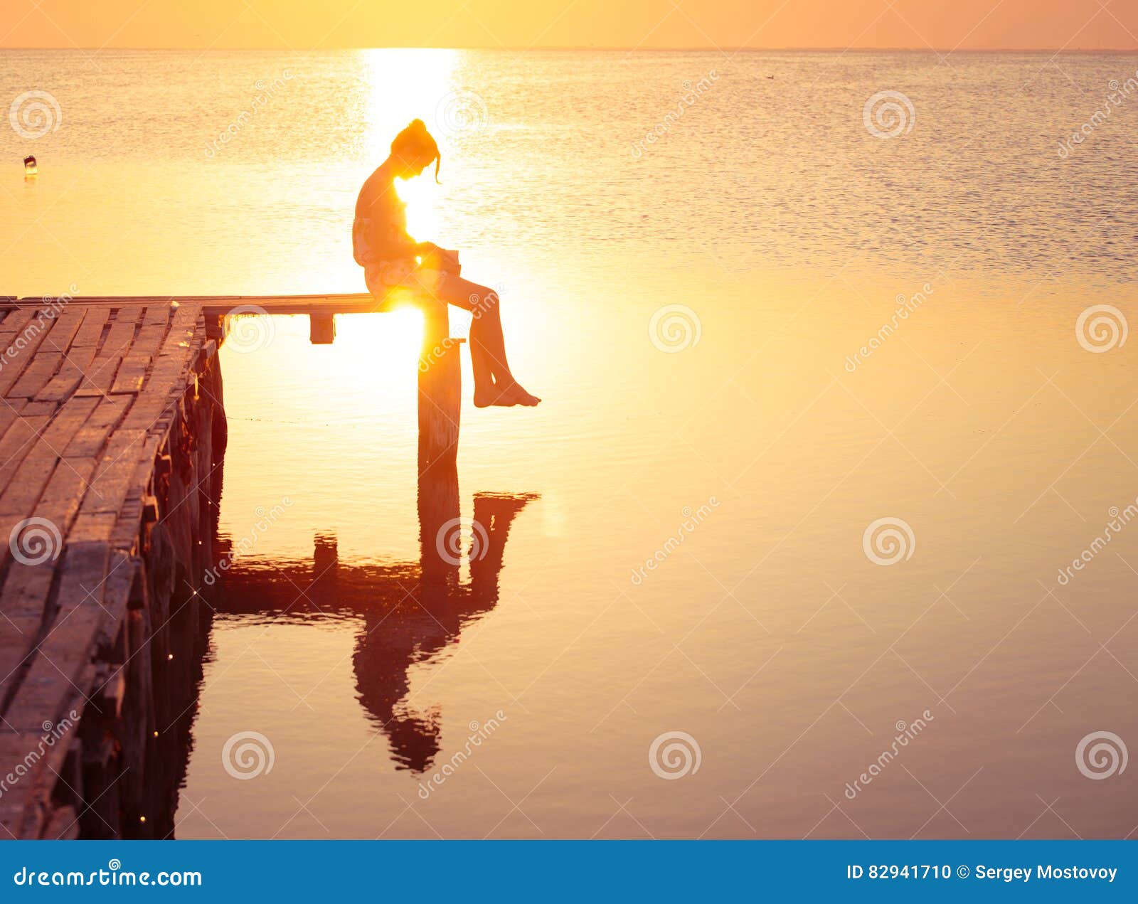 Girl Reading at the Sunset Time Stock Photo - Image of landscape, adult ...