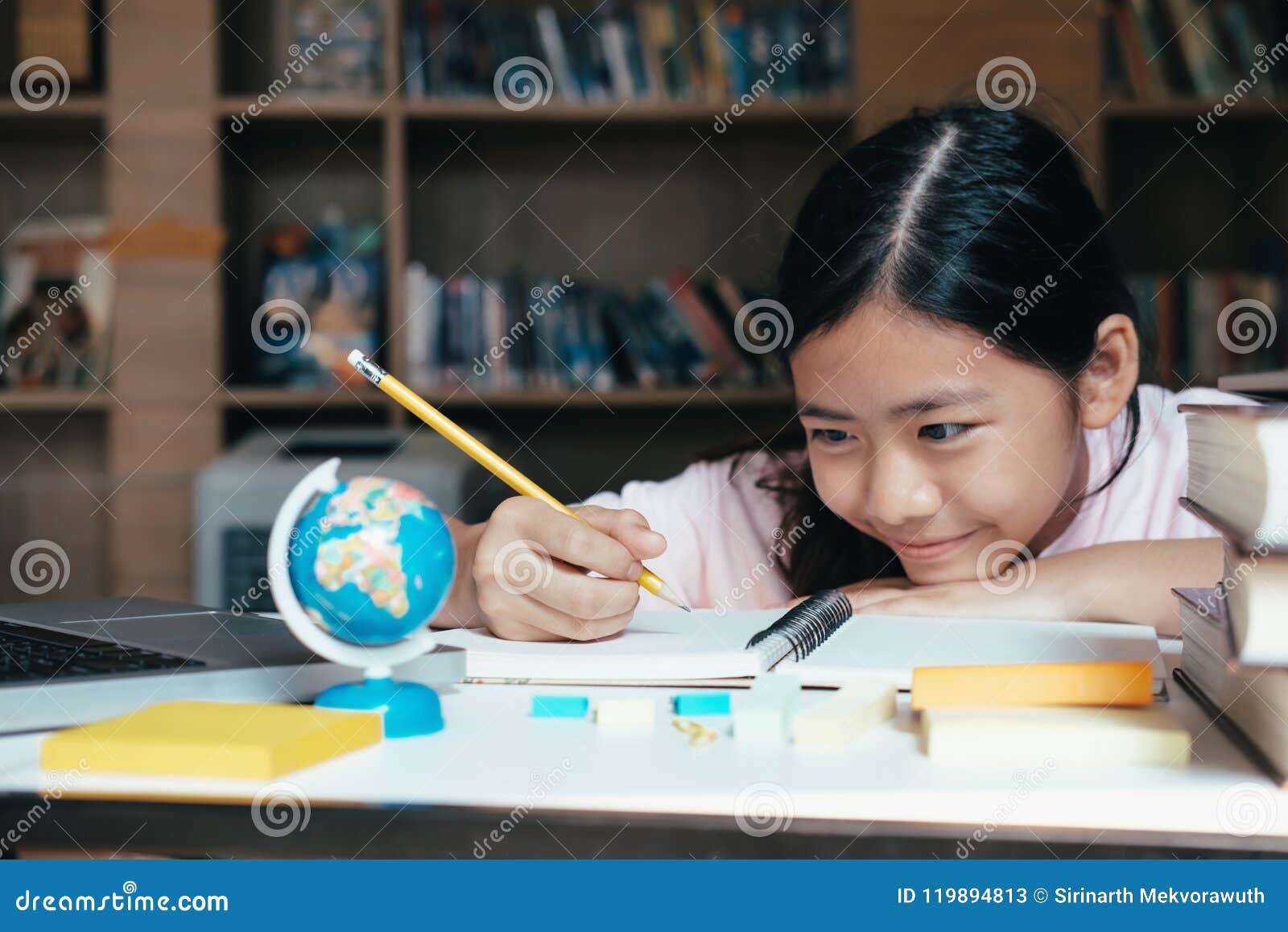 Girl Reading and Writing and Do Homework in Library Stock Image - Image ...