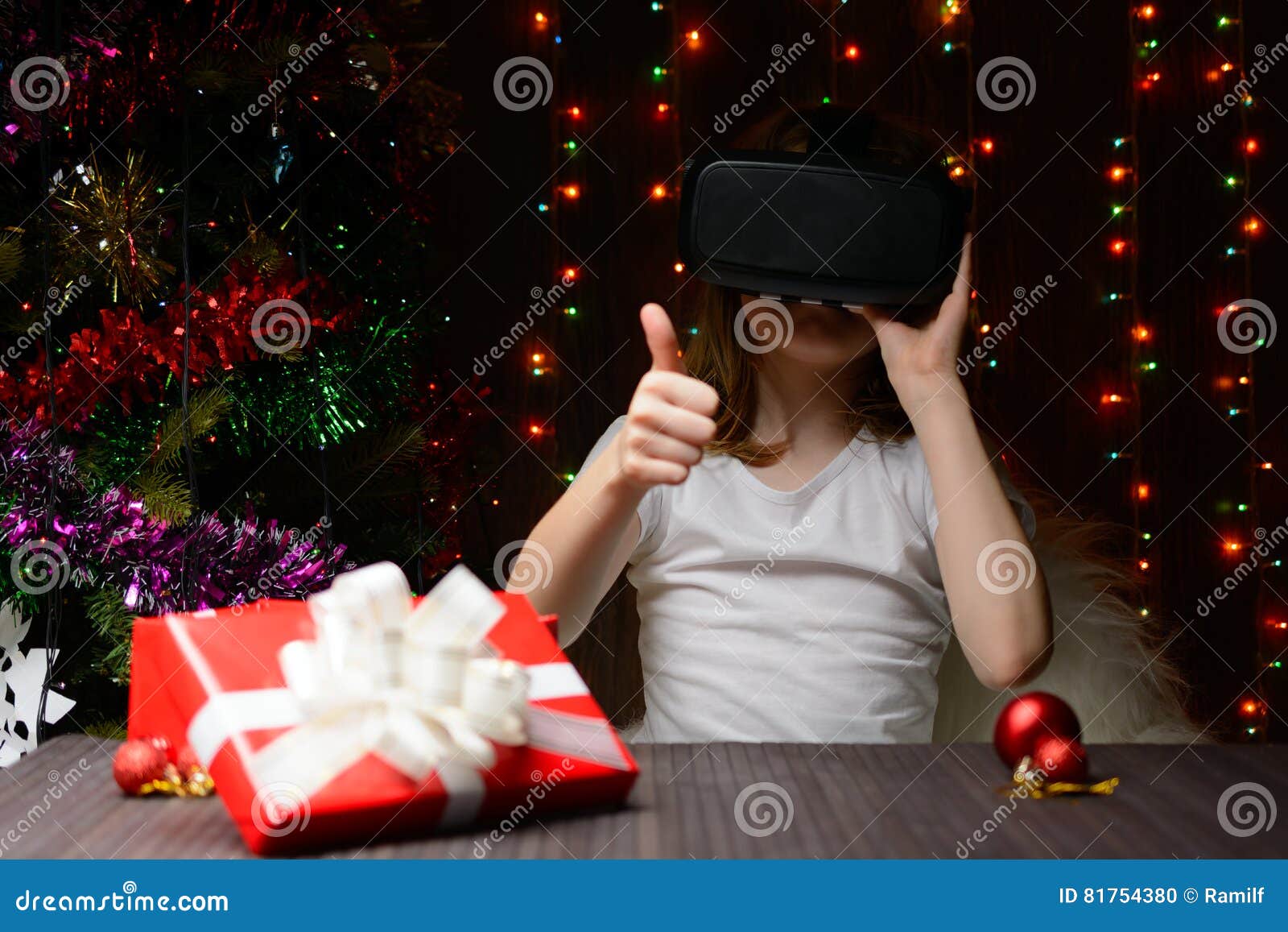 The Girl Received a Christmas Present Virtual Glasses Stock Photo ...