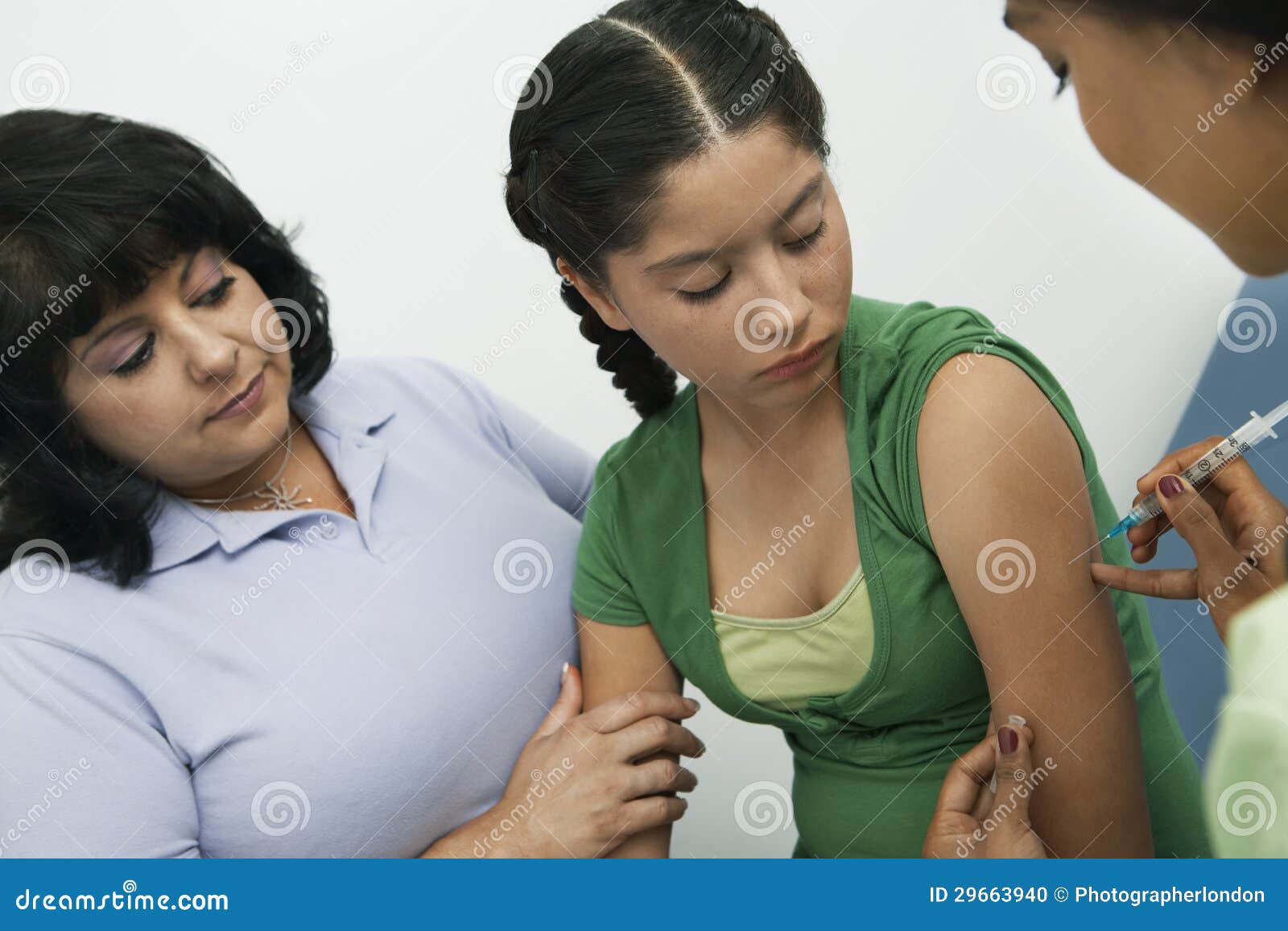 Girl Receiving an Injection Stock Photo - Image of hospital, healthcare ...