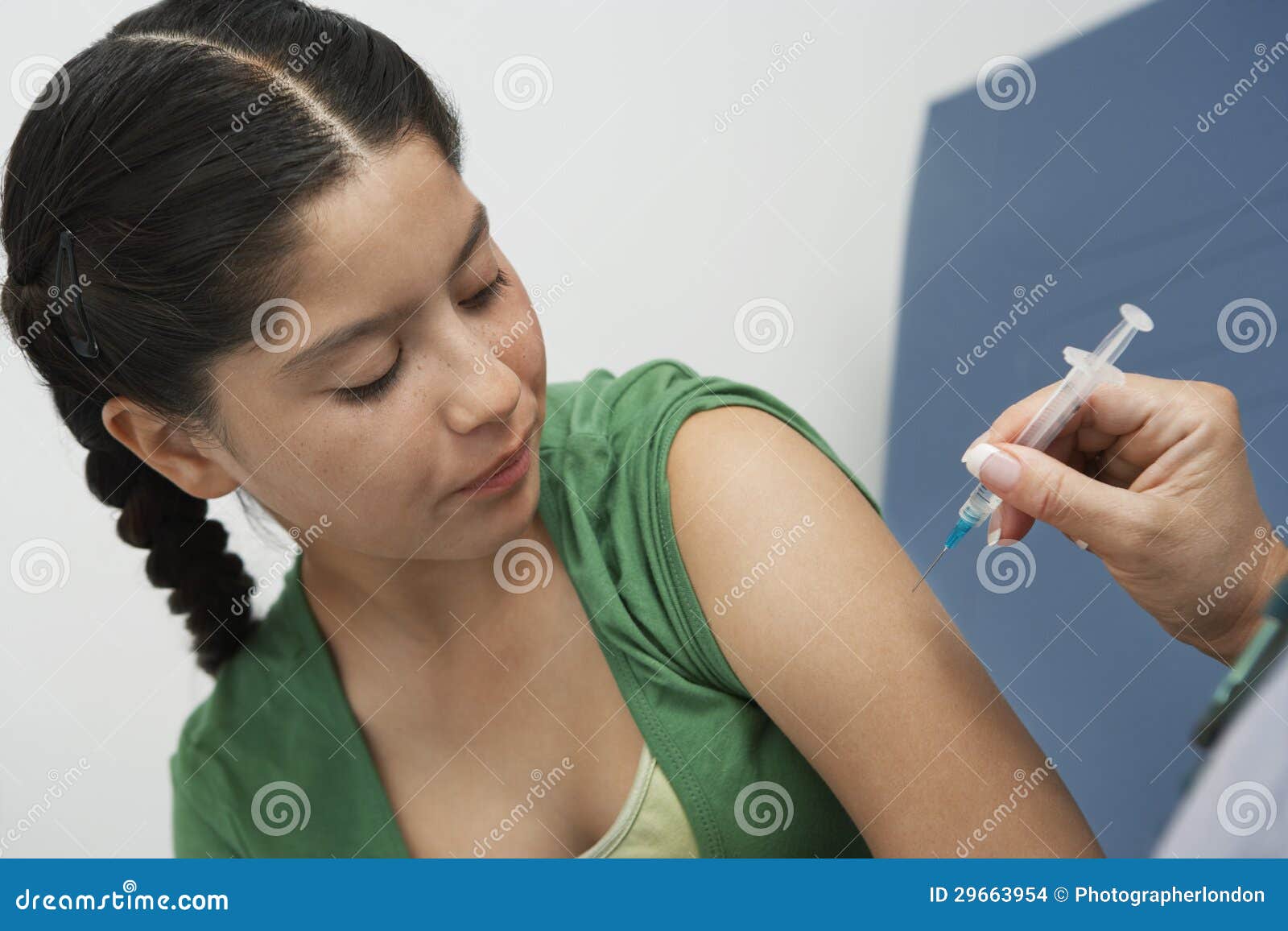Girl Receiving an Injection Stock Photo - Image of cropped, examination ...