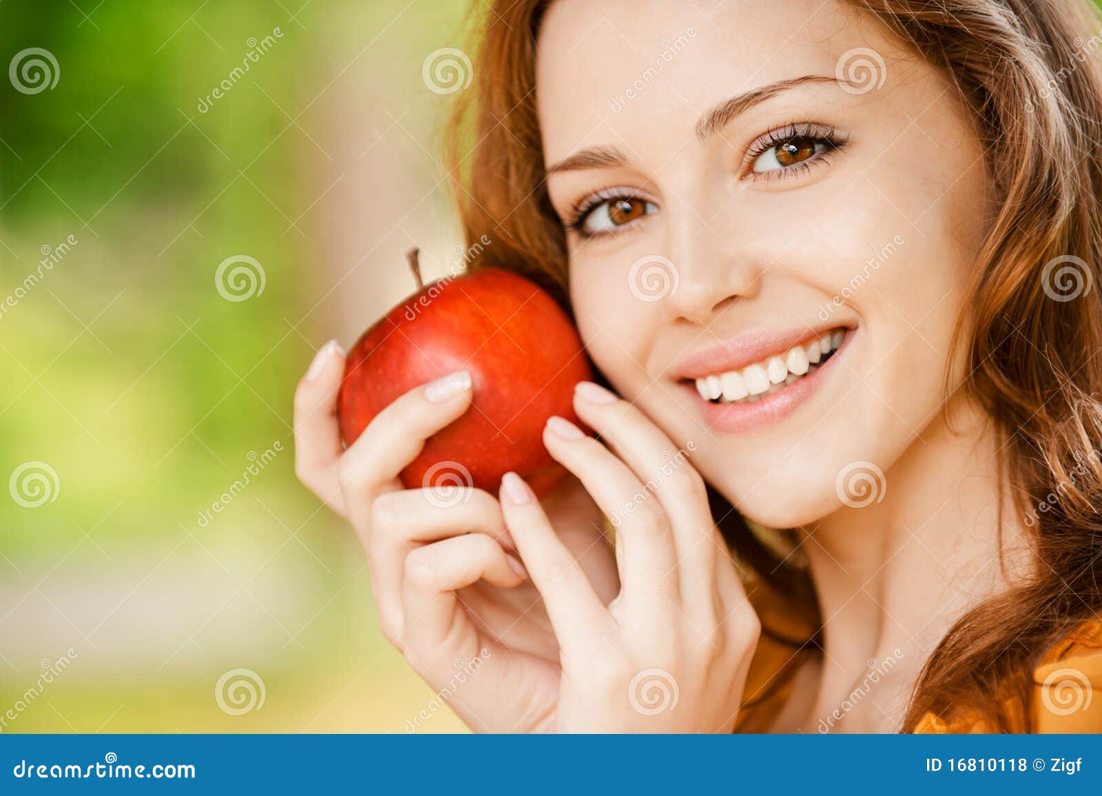 Girl with red apple stock photo. Image of closeup, apples - 16810118