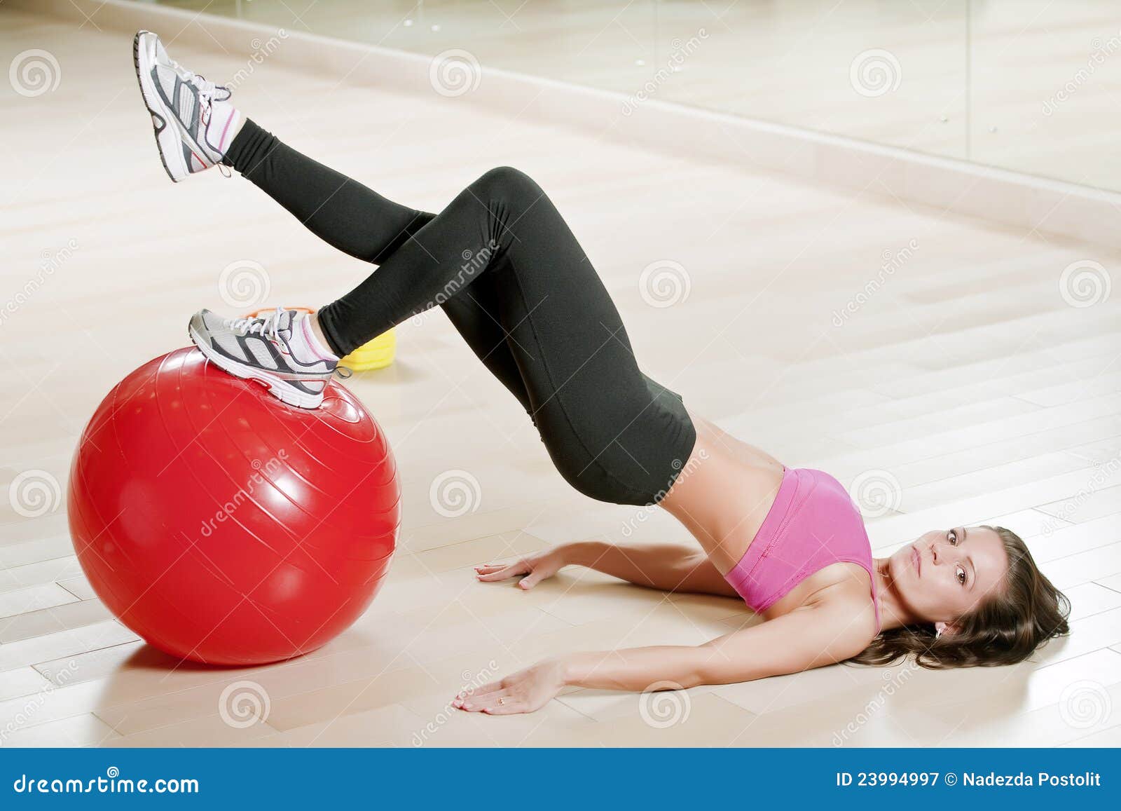 Girl with a red ball stock image. Image of pilates, active - 23994997