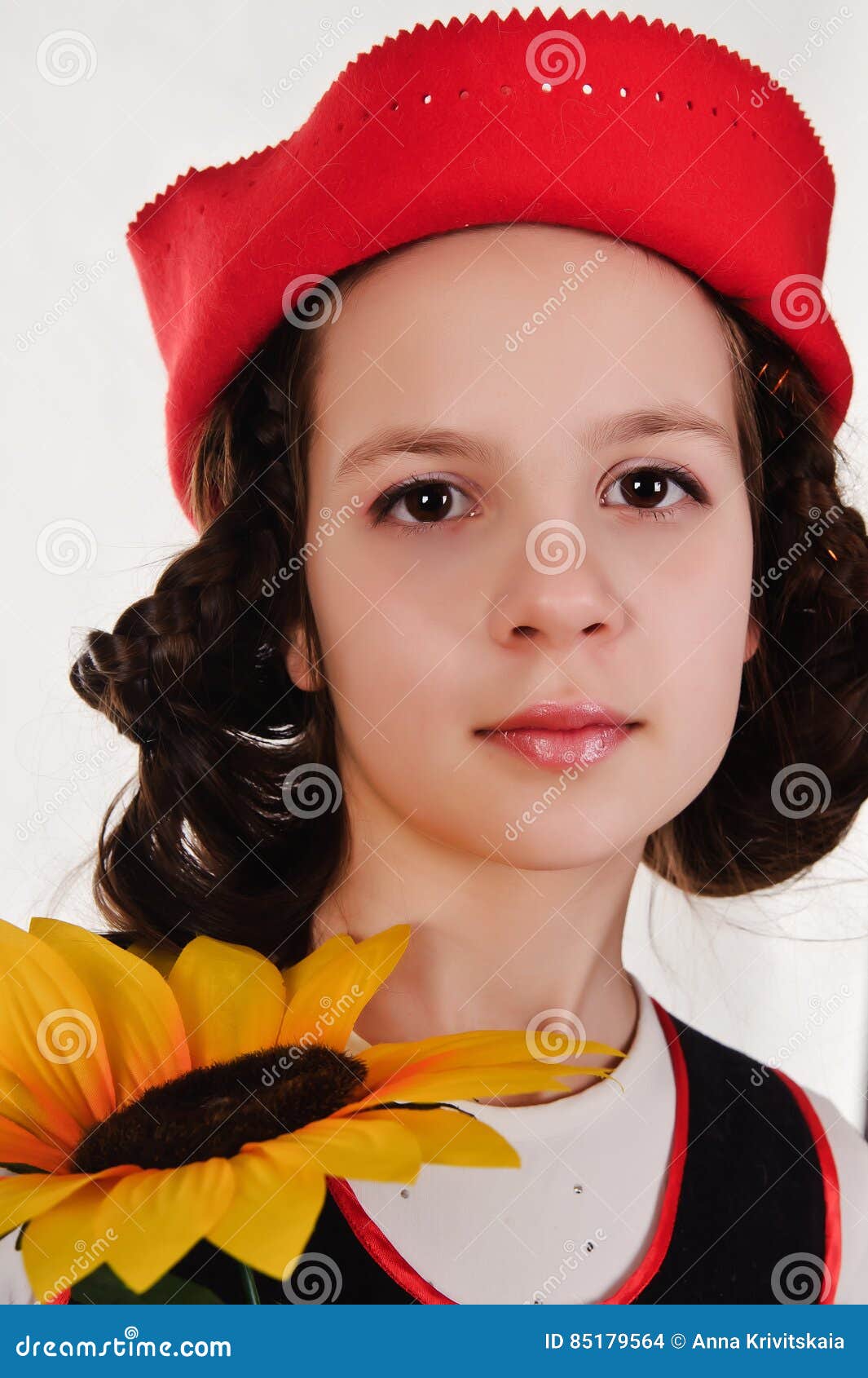 Girl in a Red Cap with a Sunflower Stock Photo - Image of desolate ...