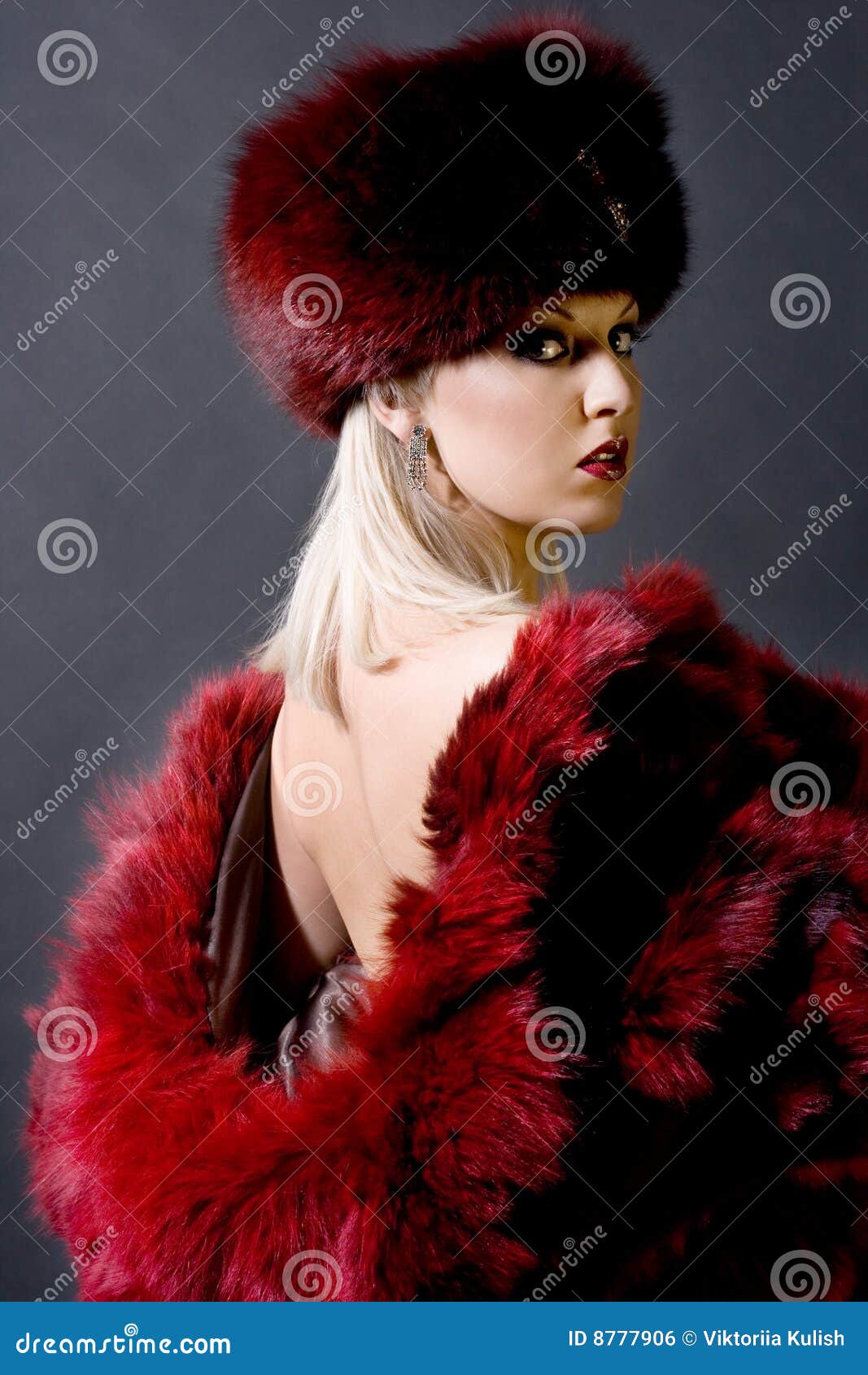 Girl in a red fur cap stock photo. Image of brooch, naked - 8777906