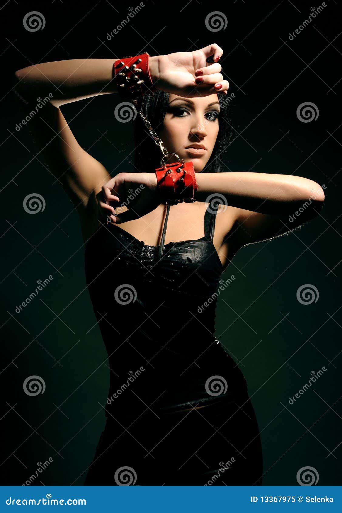 Girl in red handcuffs stock image. Image of beautiful - 13367975