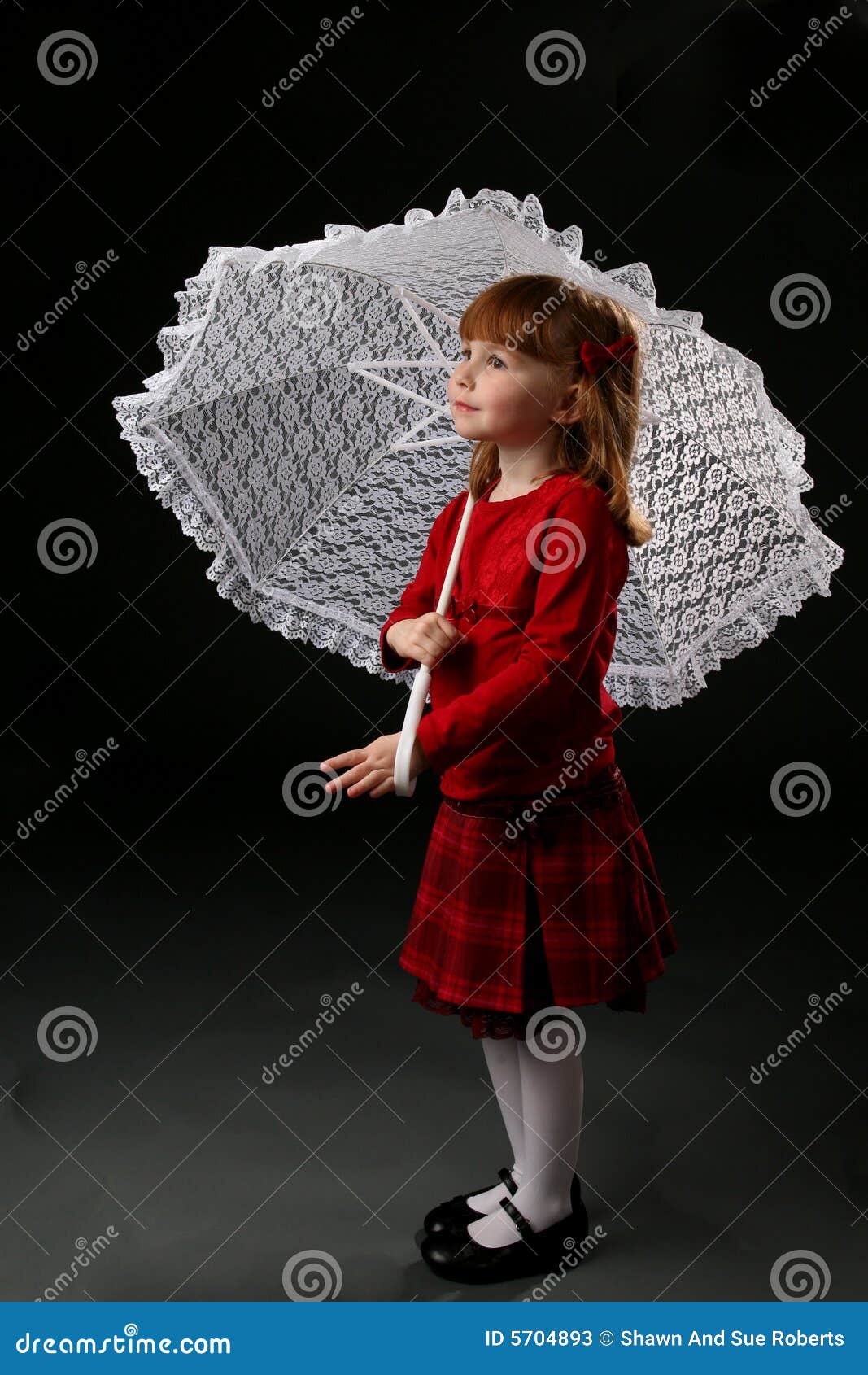 Girl in Red Holding a Parasol Stock Image - Image of little, demure ...