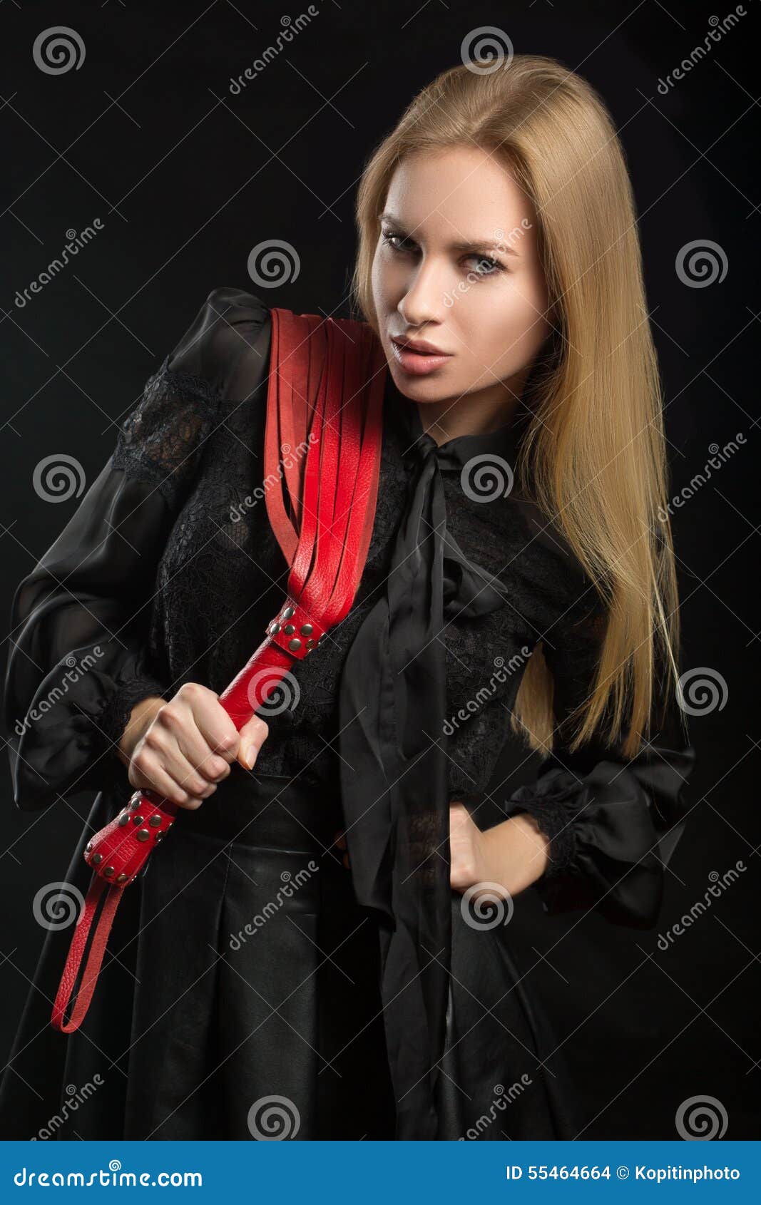 Girl with red leather whip stock photo. Image of bdsm - 55464664