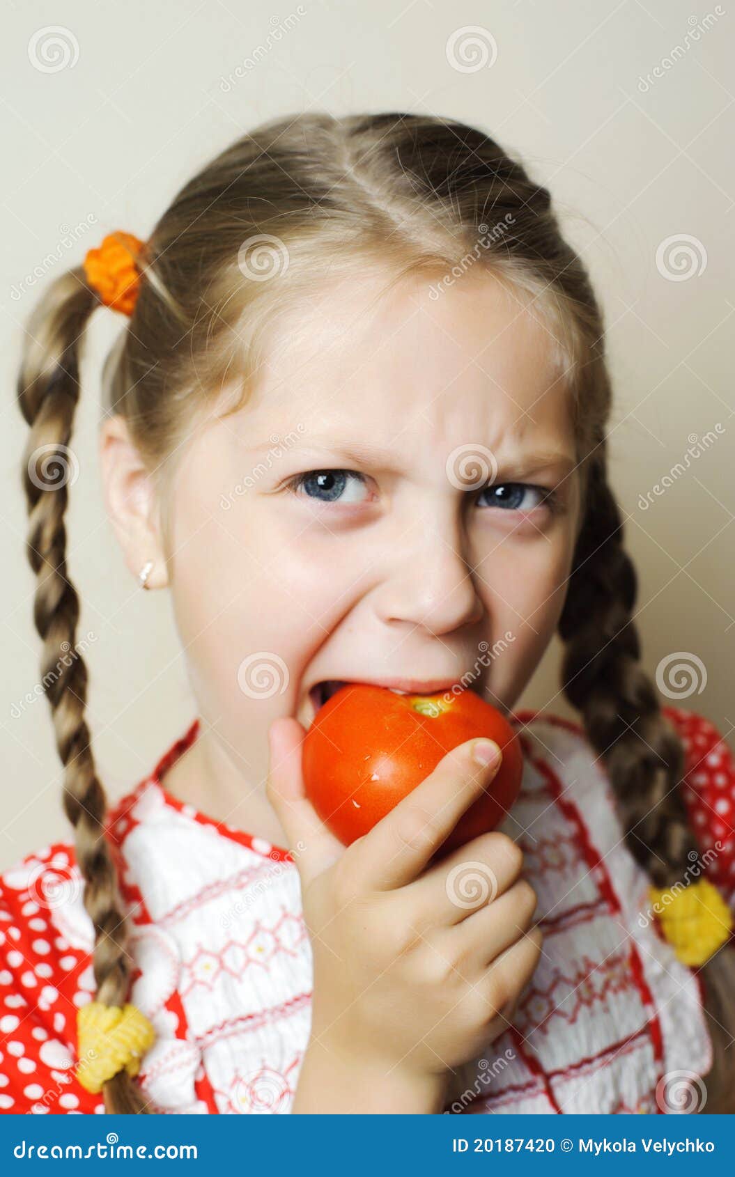 Girl with red tomato stock photo. Image of fruit, health - 20187420