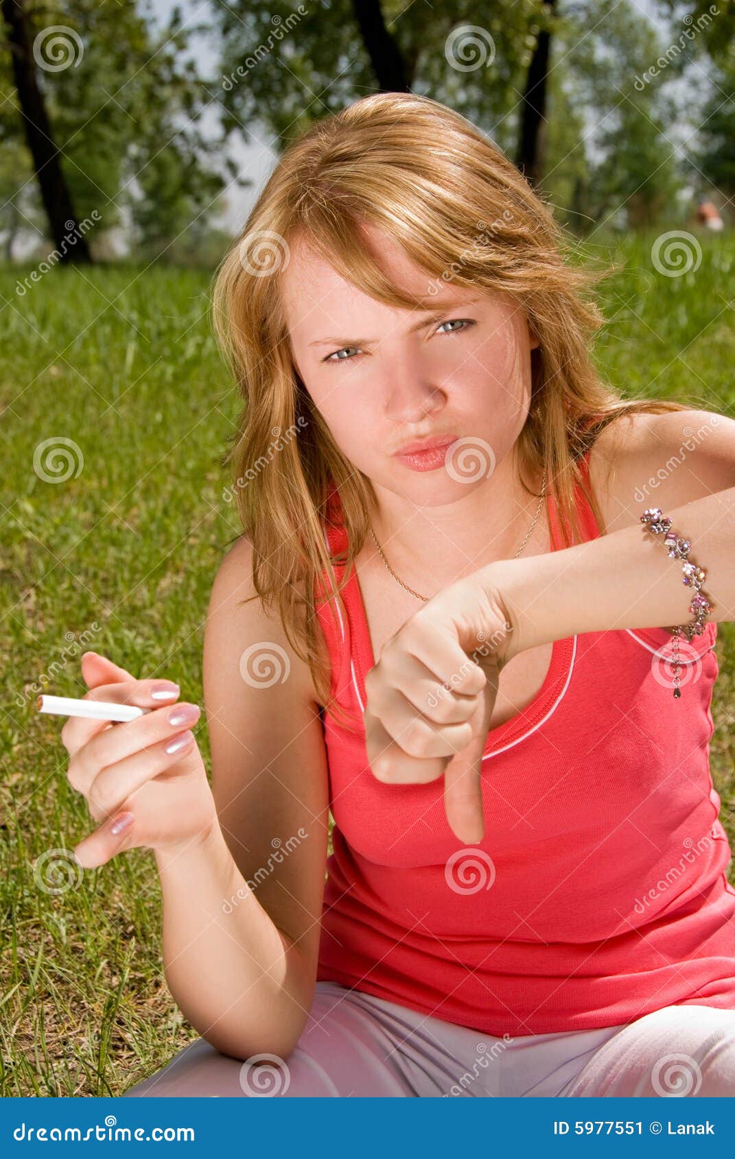 Girl refusing a sigarette stock image. Image of expression - 5977551