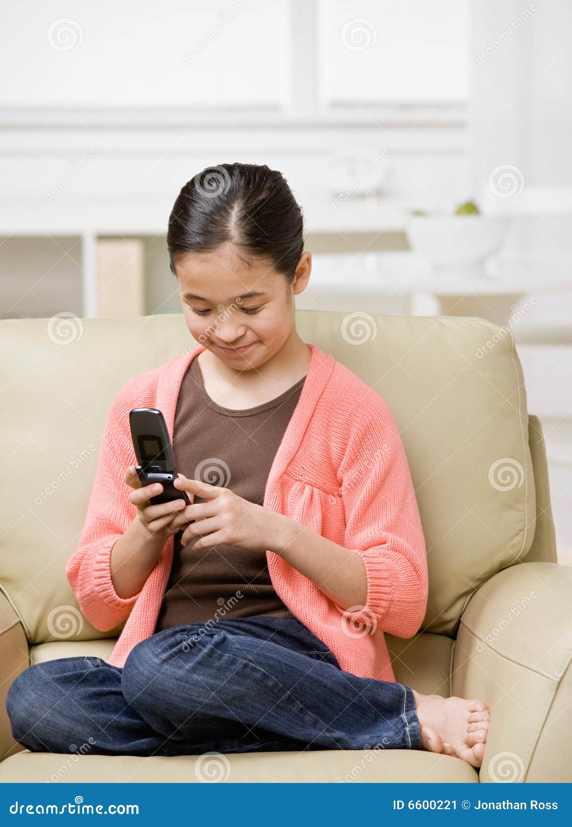 Girl Relaxing On Sofa And Text Messaging Stock Image Image Of Messaging Cell 6600221