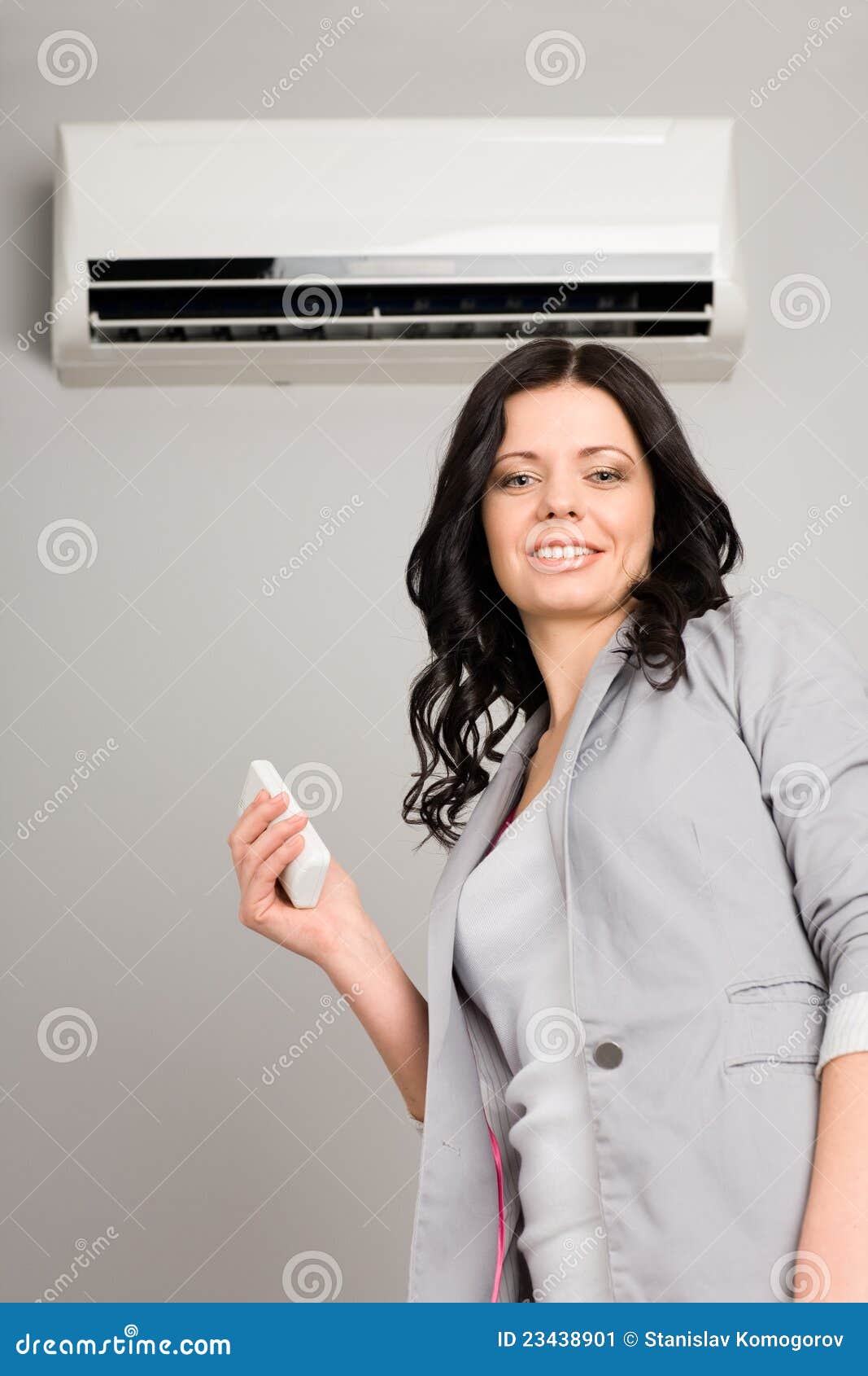 Girl with a Remote Control Air Conditioner Stock Image - Image of ...