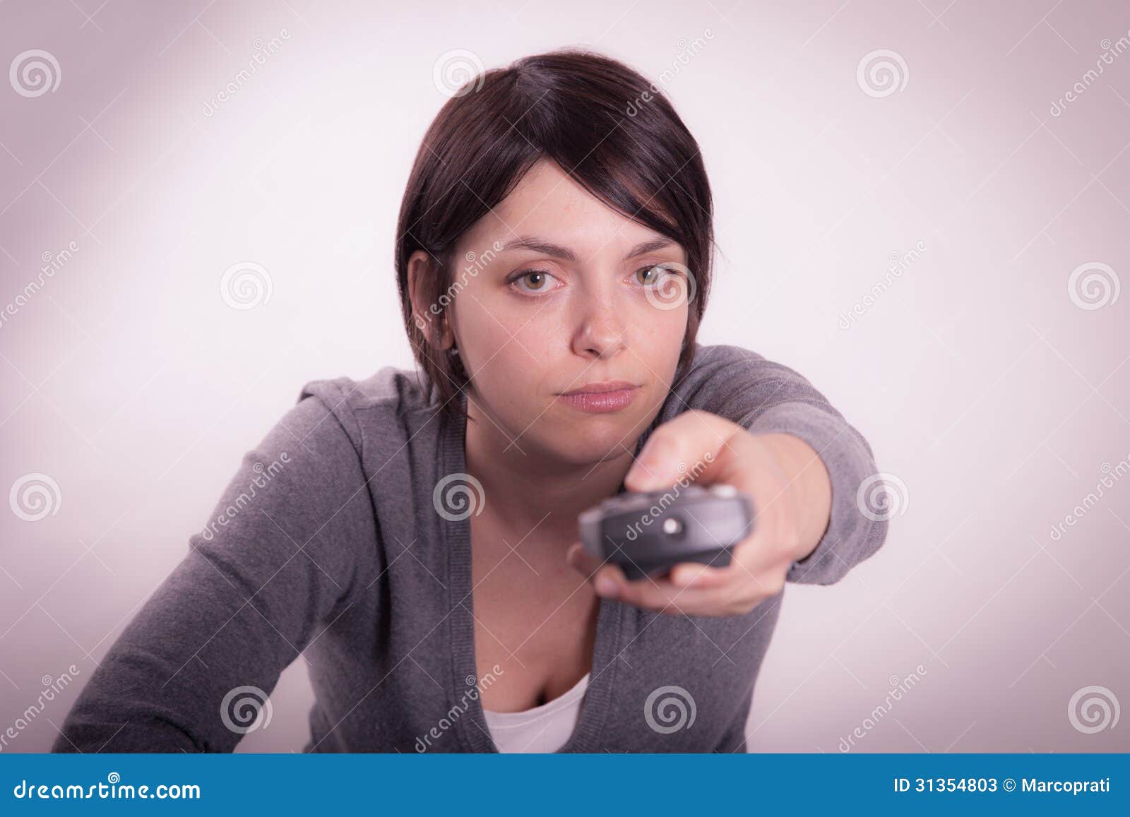 Girl with remote control stock image. Image of holding - 31354803