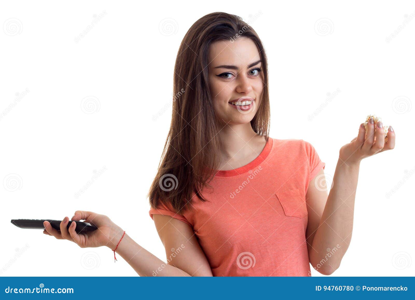 Girl with Remote Control from the Tv and Popcorn in the Hands of ...