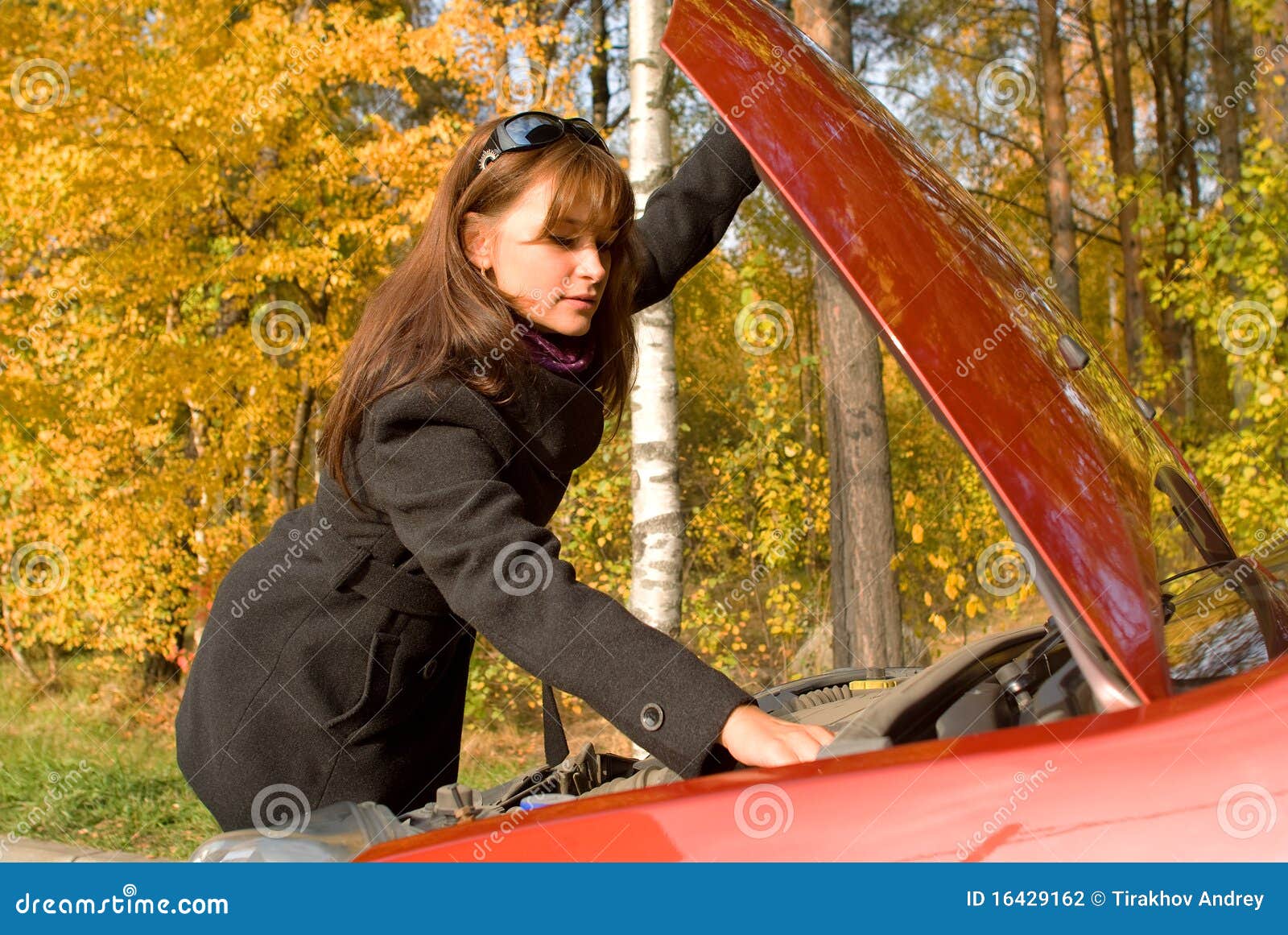 Girl repairs the car motor stock photo. Image of disappointed - 16429162