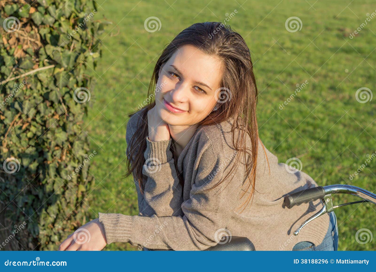 Girl resting on bike stock photo. Image of lawn, angelic - 38188296