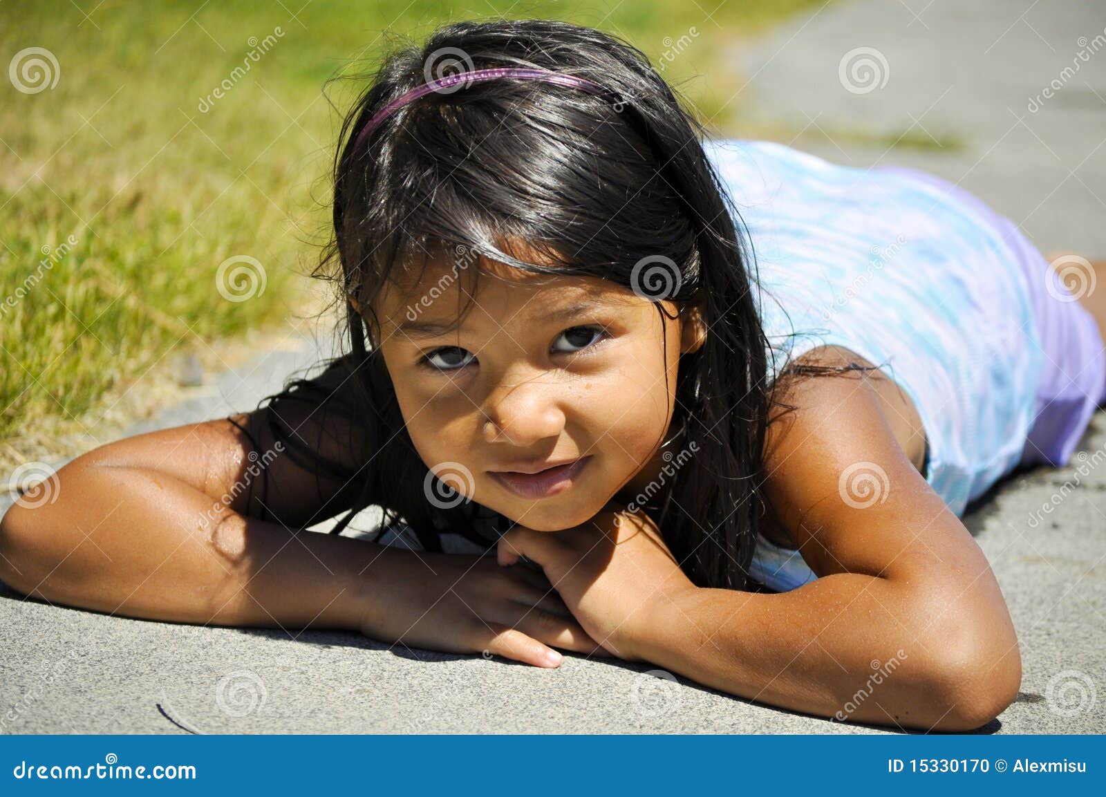 Girl resting on the ground stock photo. Image of leisure - 15330170